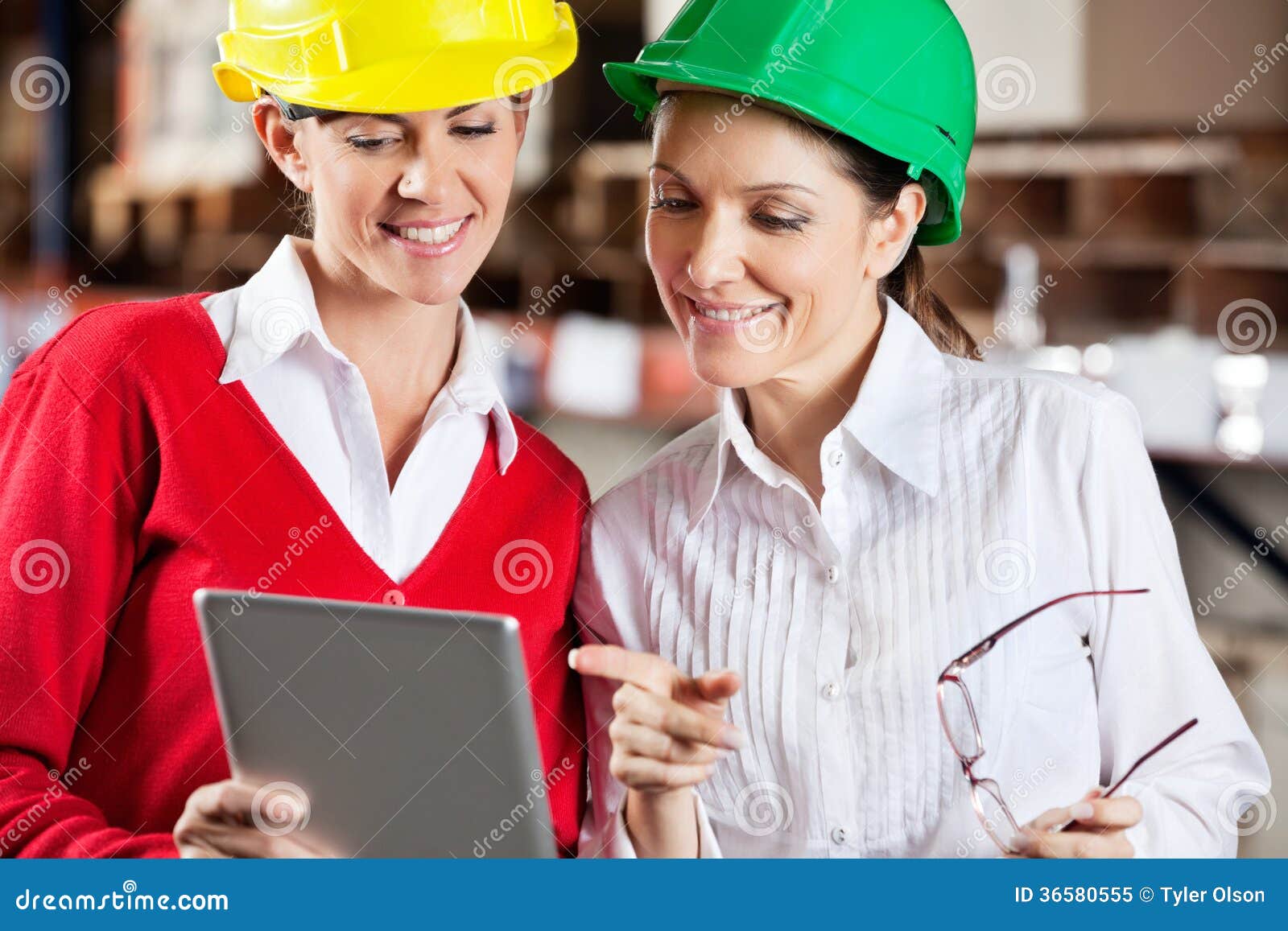 Female Supervisors Using Digital Tablet at Stock Image - Image of ...