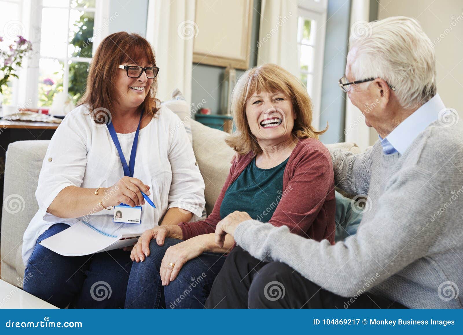 Female Support Worker Visits Senior Couple at Home Stock Image - Image ...