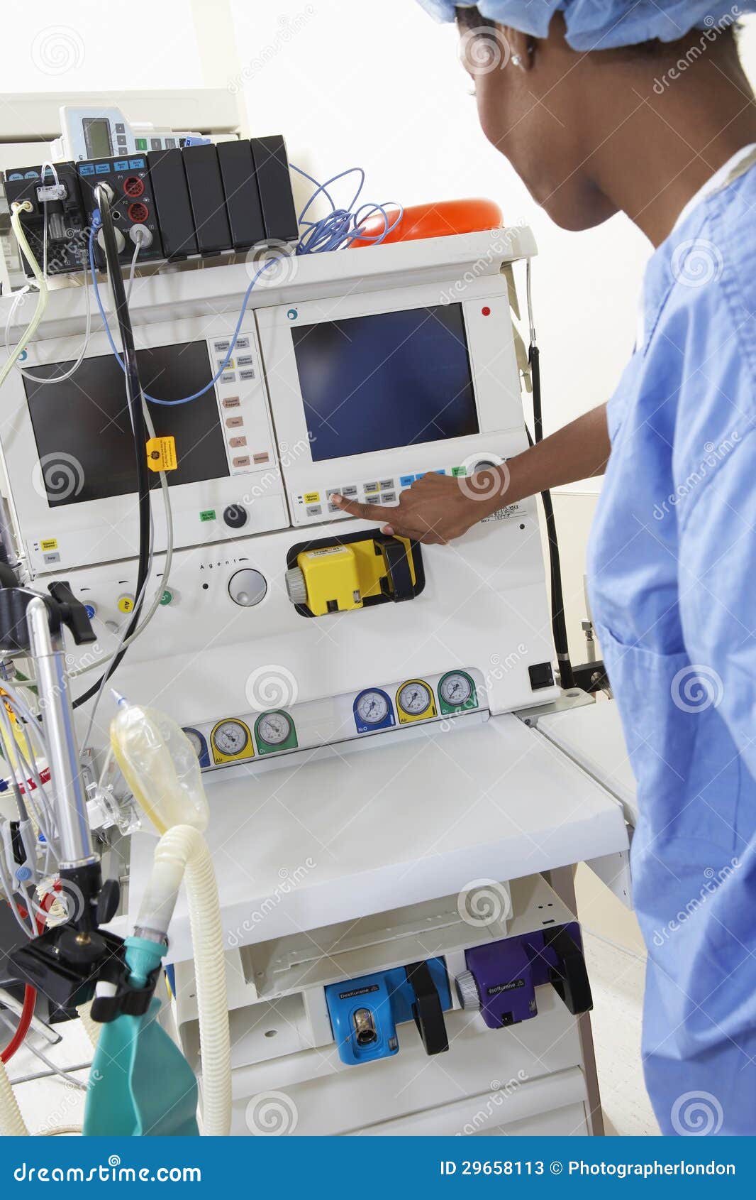 Female Surgeon Operating Medical Machine Stock Image - Image of ...