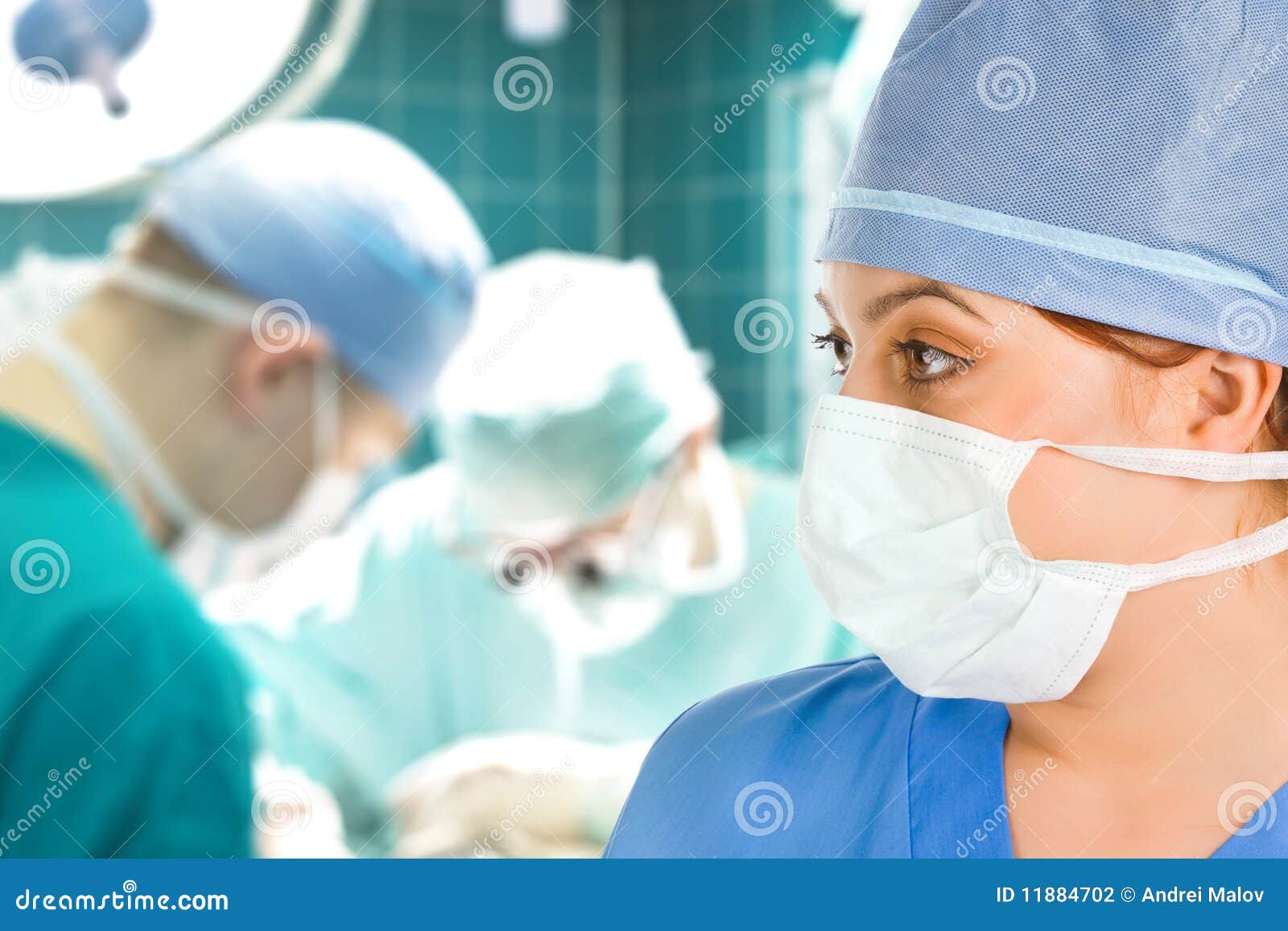 Female Surgeon with Surgical Team Stock Photo - Image of gloves ...