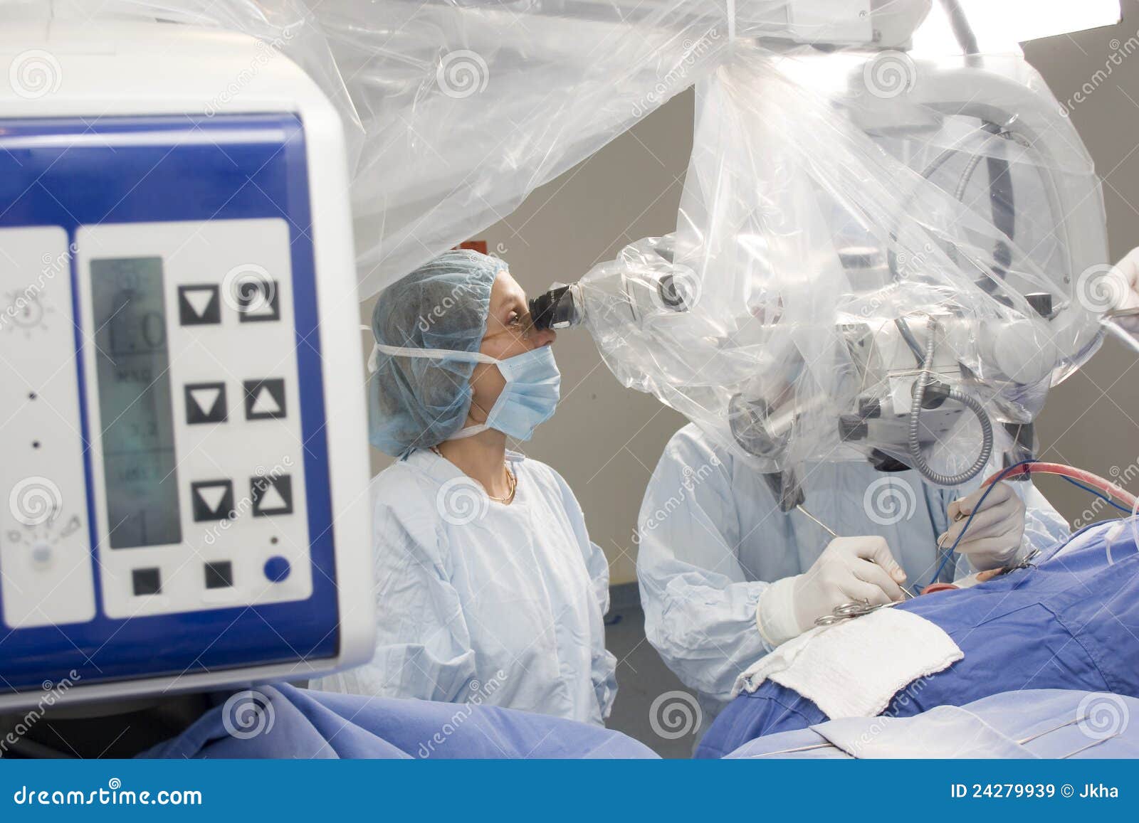 Female Surgeon Using Operating Microscope Stock Image - Image of ...