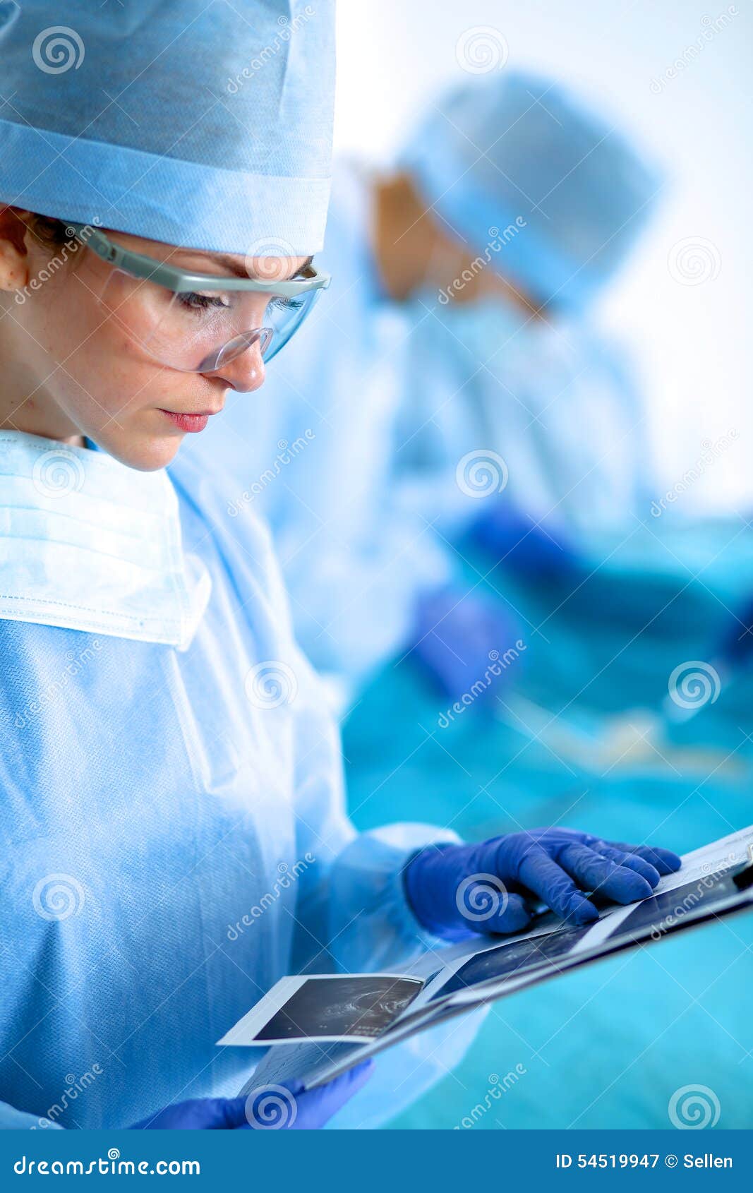 Female Surgery in the Operating Room Stock Image - Image of assistant ...