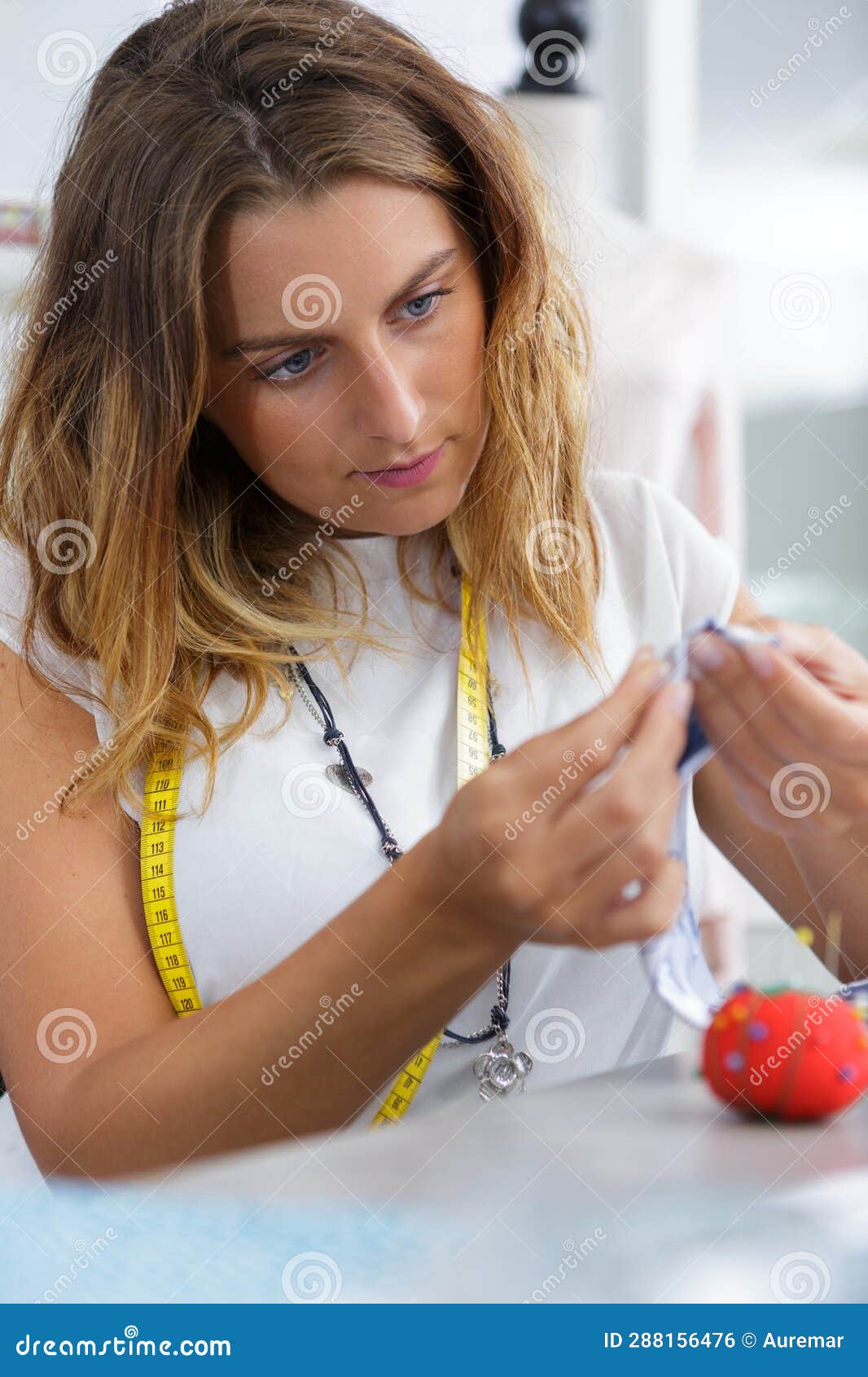 Female Tailor Inserting Thread in Needle Stock Photo - Image of female ...