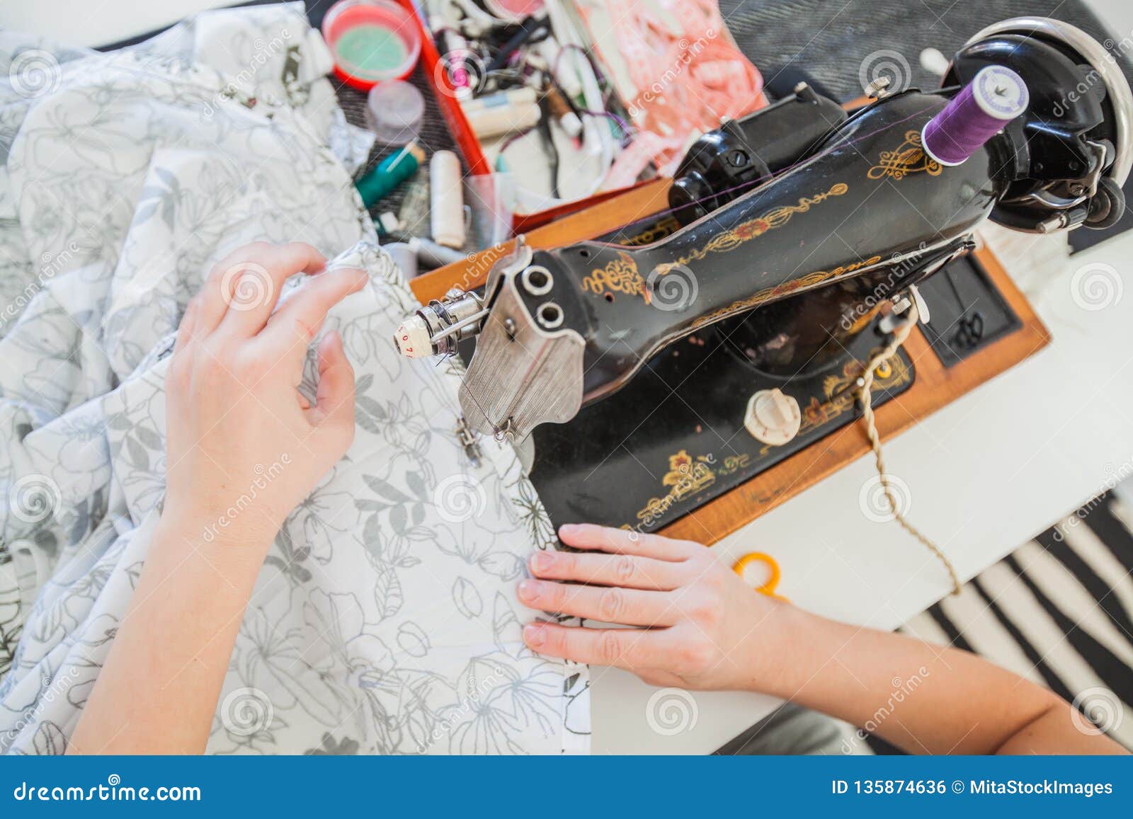 Female Tailor Using Retro Sewing Machine at Home Stock Photo - Image of ...