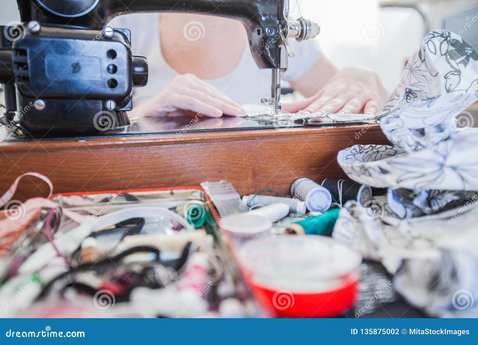 Female Tailor Using Retro Sewing Machine at Home Stock Photo - Image of ...