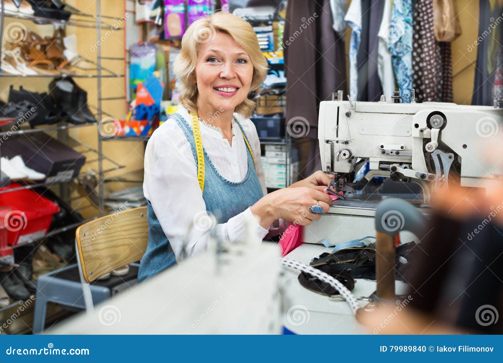 Female Tailor Working on Sewing Machine Stock Photo - Image of atelier ...
