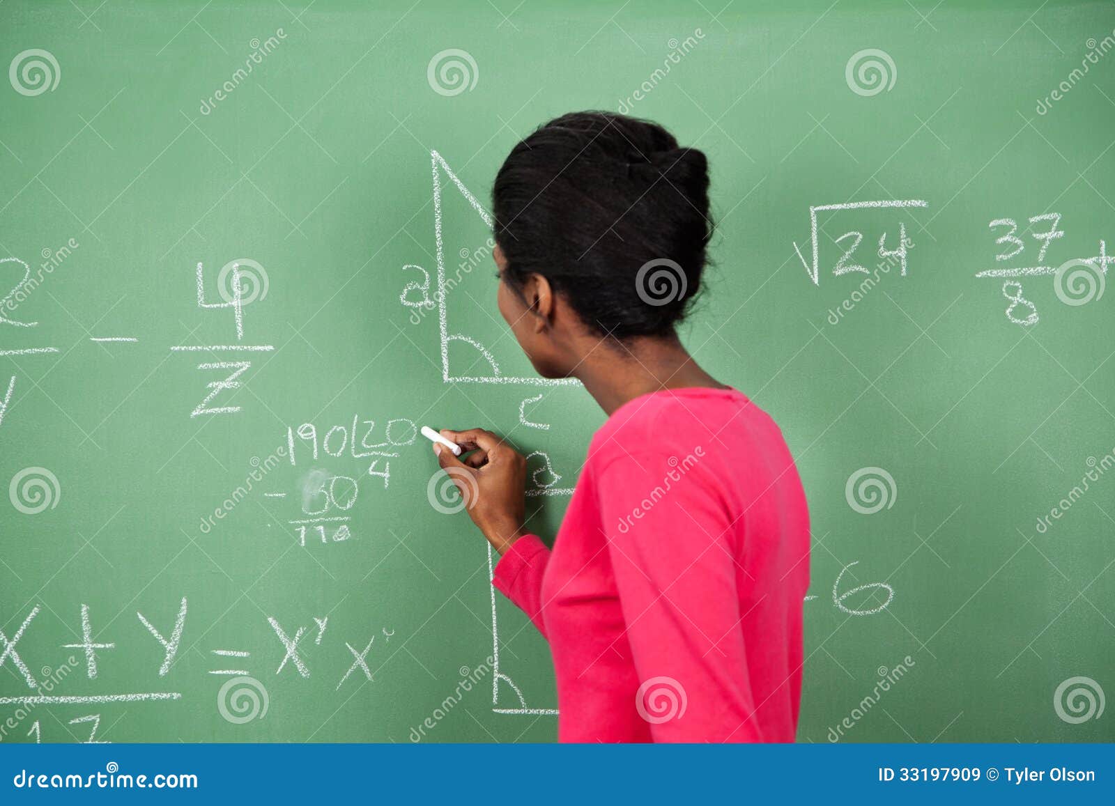 Female Teacher Solving Mathematics on Board Stock Image - Image of ...