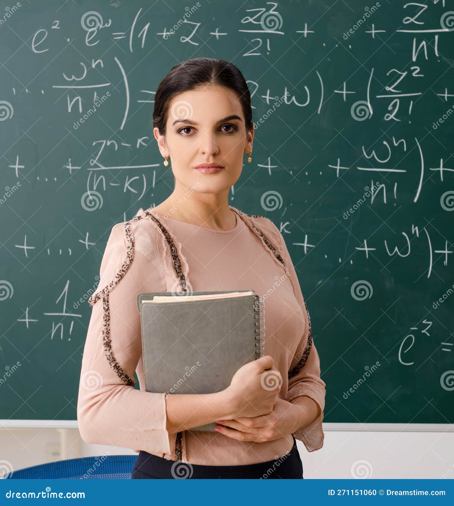 Female Teacher Standing in Front of Chalkboard Stock Photo - Image of ...