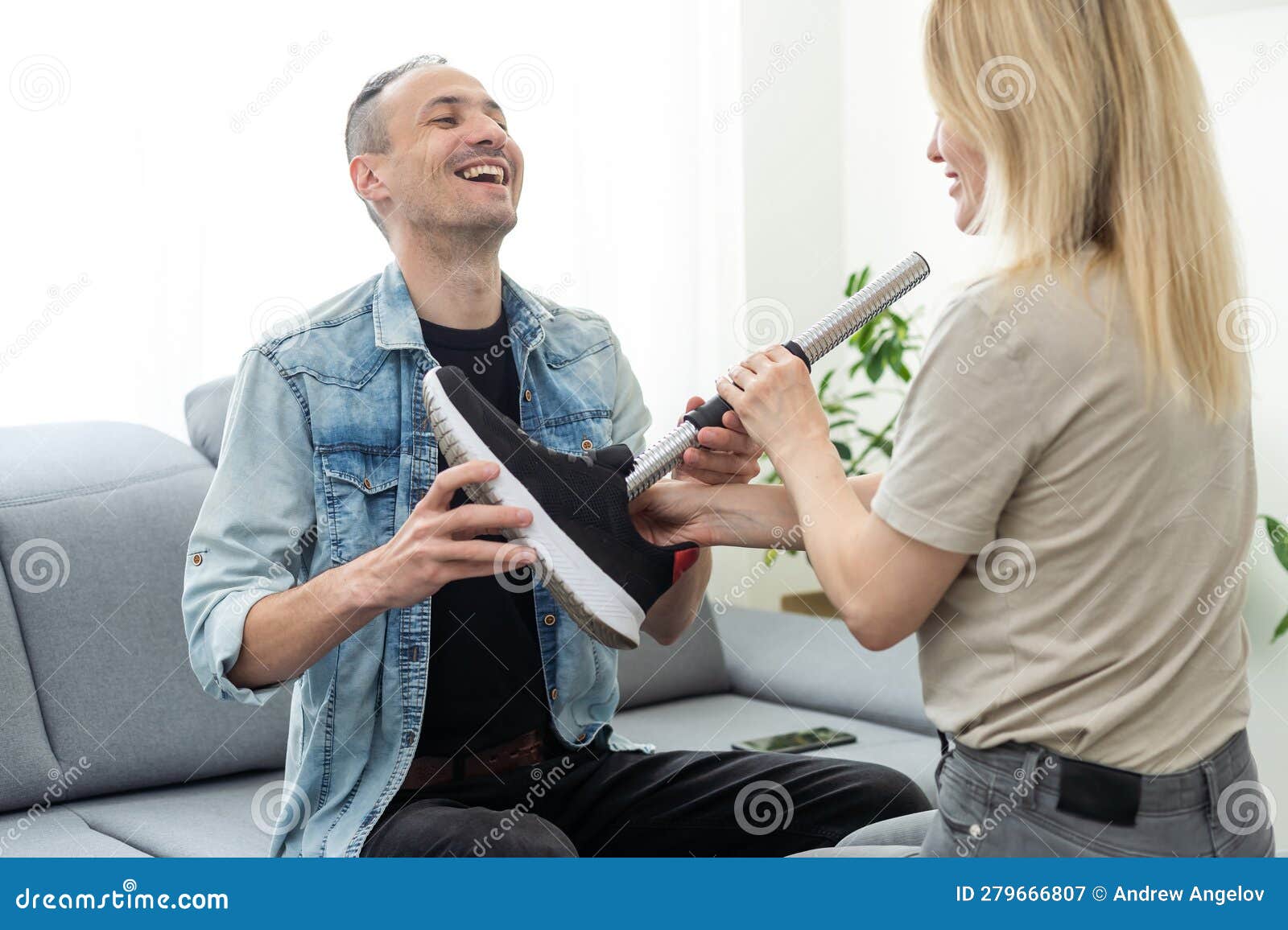 Female Technician Assembling and Fixing Parts of Modern Prosthetic Leg ...