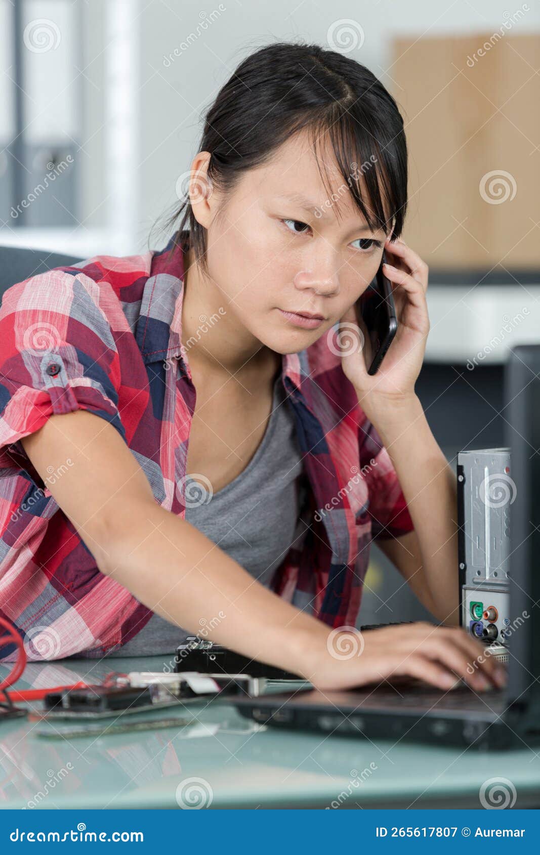 Female technician on phone stock image. Image of communication - 265617807