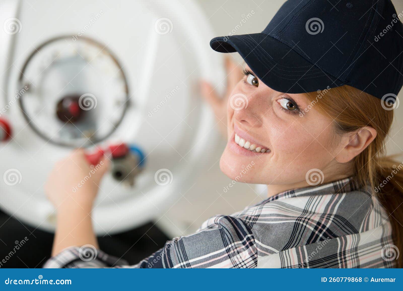 Female Technician Repairing Boiler Stock Photo - Image of turning ...