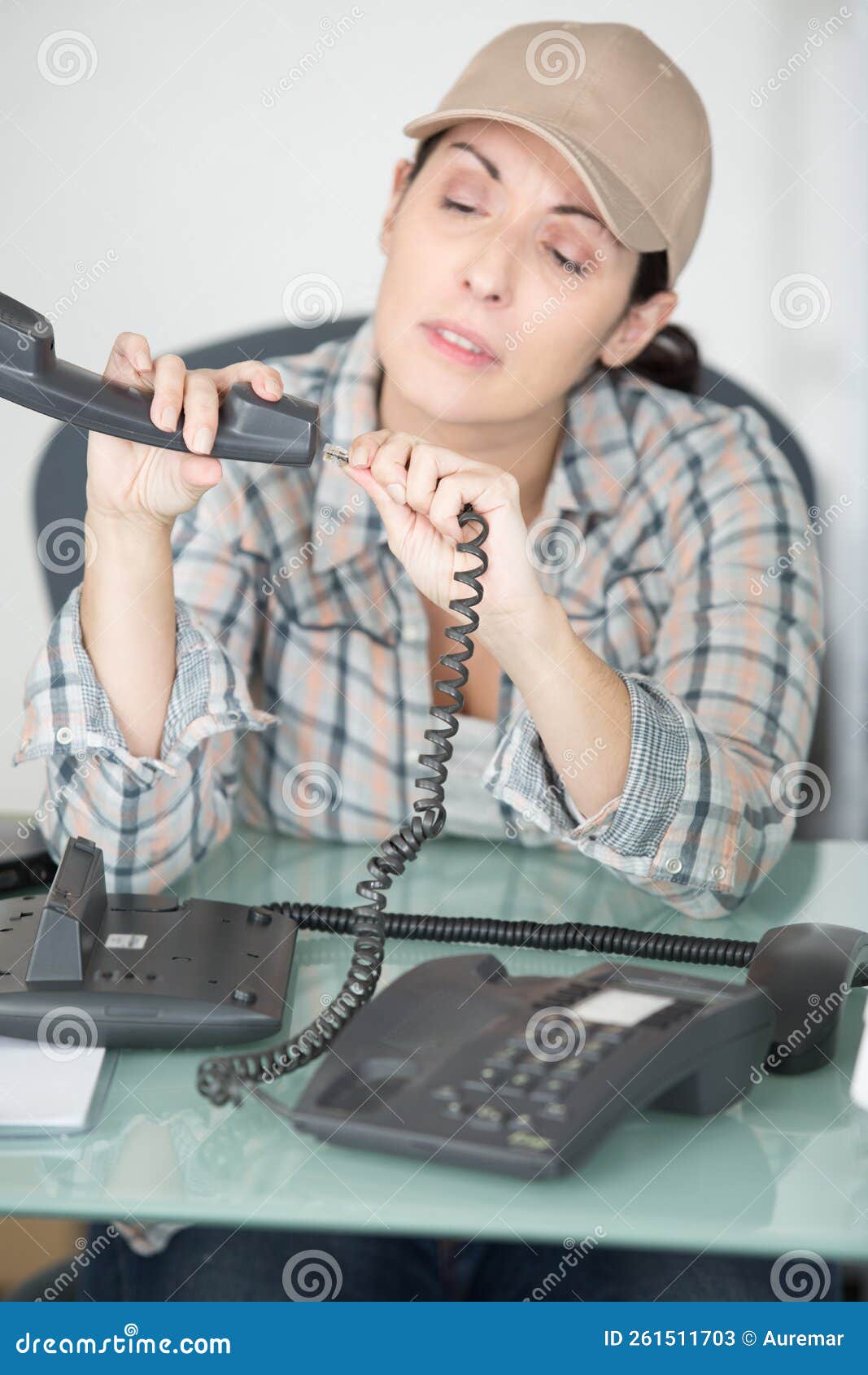 Female Technician Repairing Telephone Handset Stock Image - Image of ...