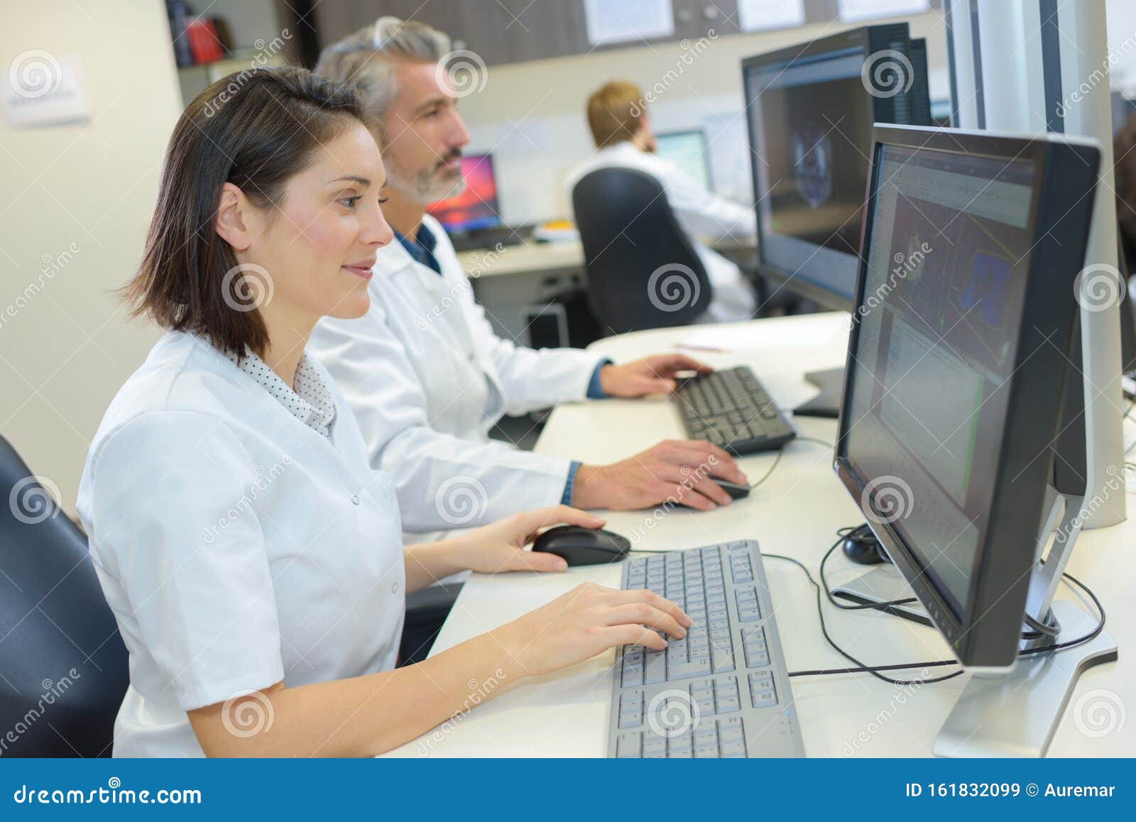 Female Technician Using Computer Stock Image - Image of health, typing ...