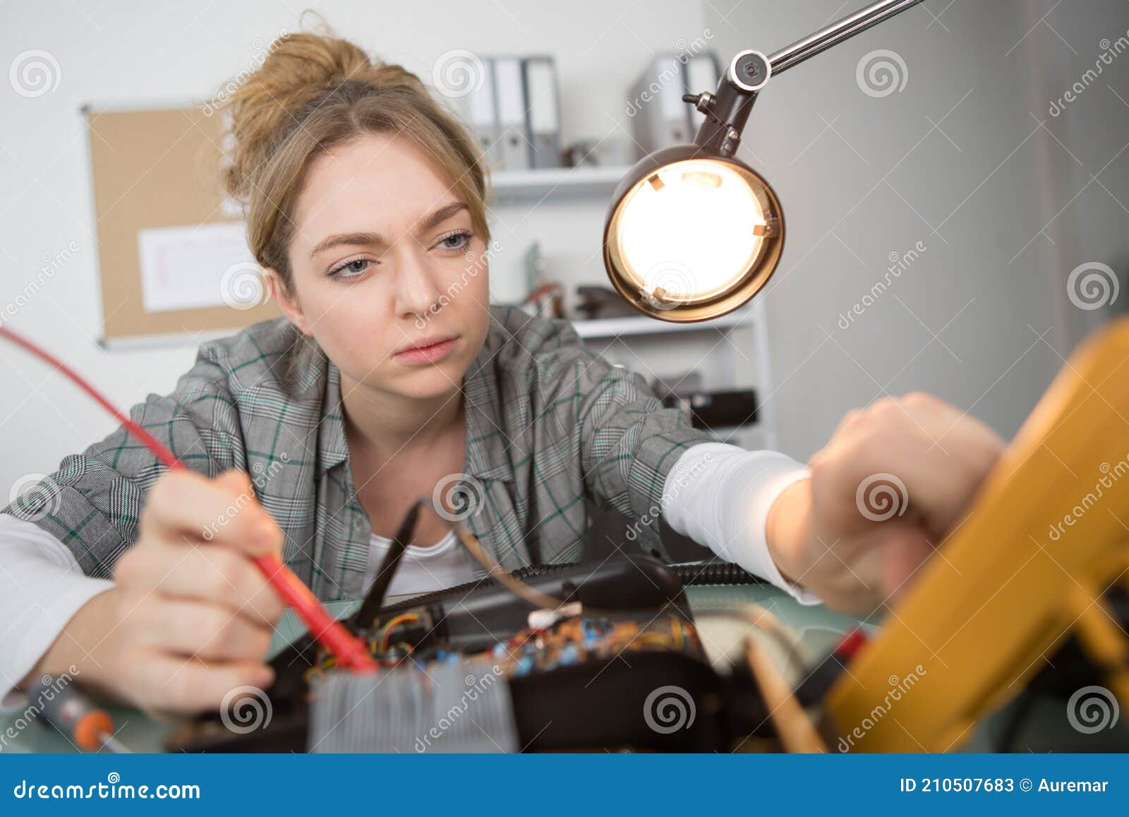 Female Technician Using Multimeter Stock Image - Image of device ...
