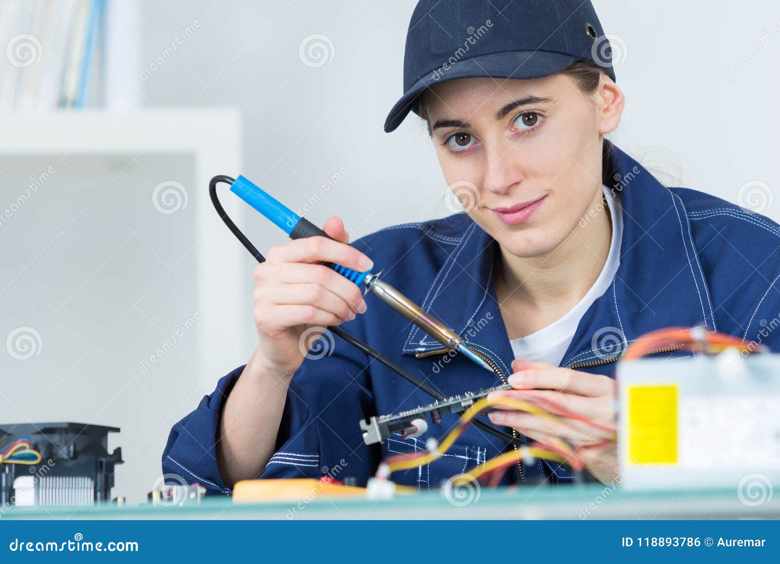 Female Technician Using Soldering Iron Stock Photo - Image of support ...