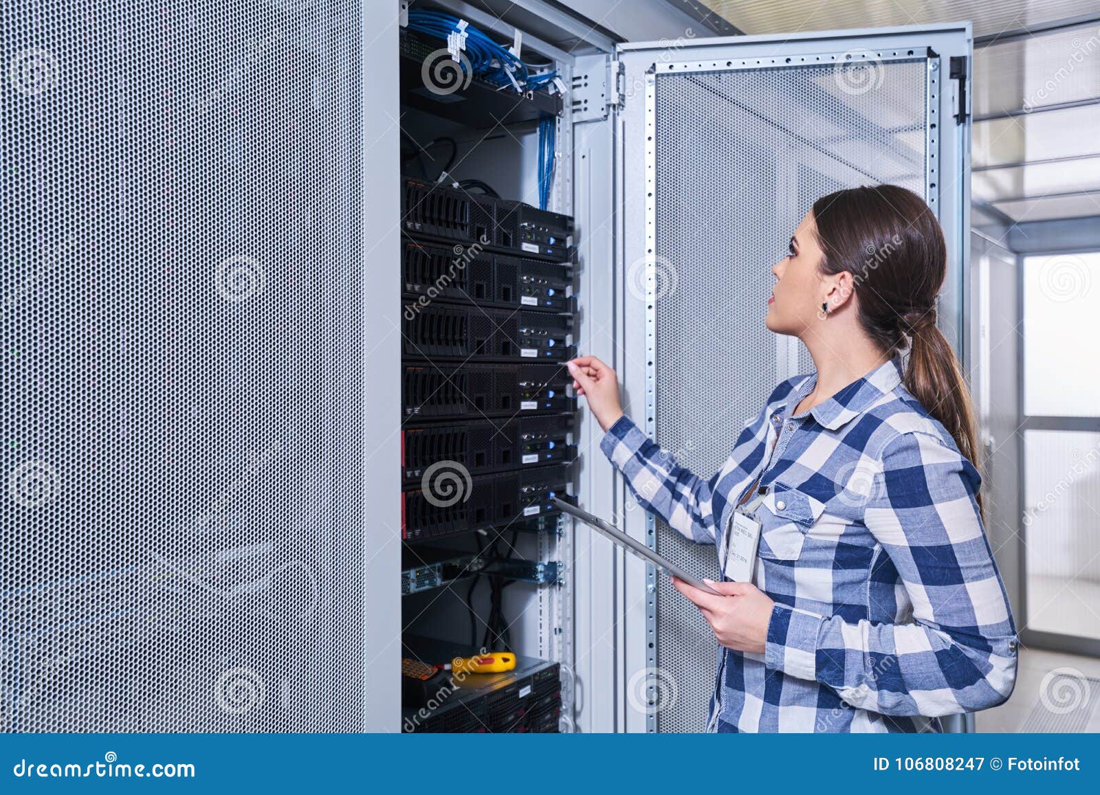 Female Technician Working on Server Maintenance Stock Image - Image of ...