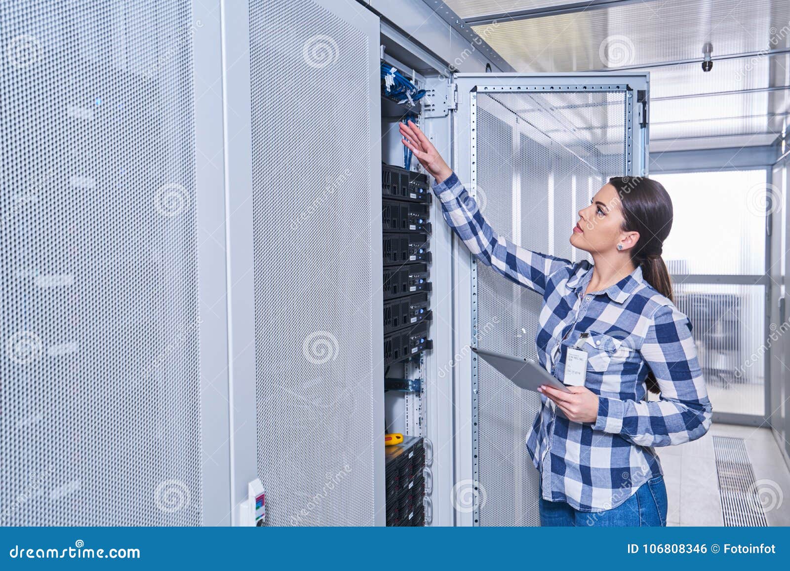 Female Technician Working on Server Maintenance Stock Photo - Image of ...