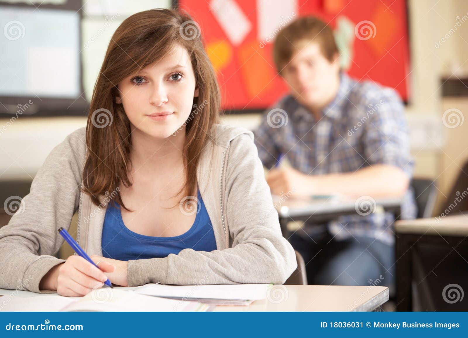 Female Teenage Student Studying in Classroom Stock Image - Image of ...