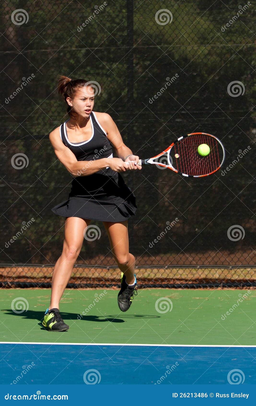 Female Tennis Player Hits Powerful Backhand Stock Photo - Image of ...