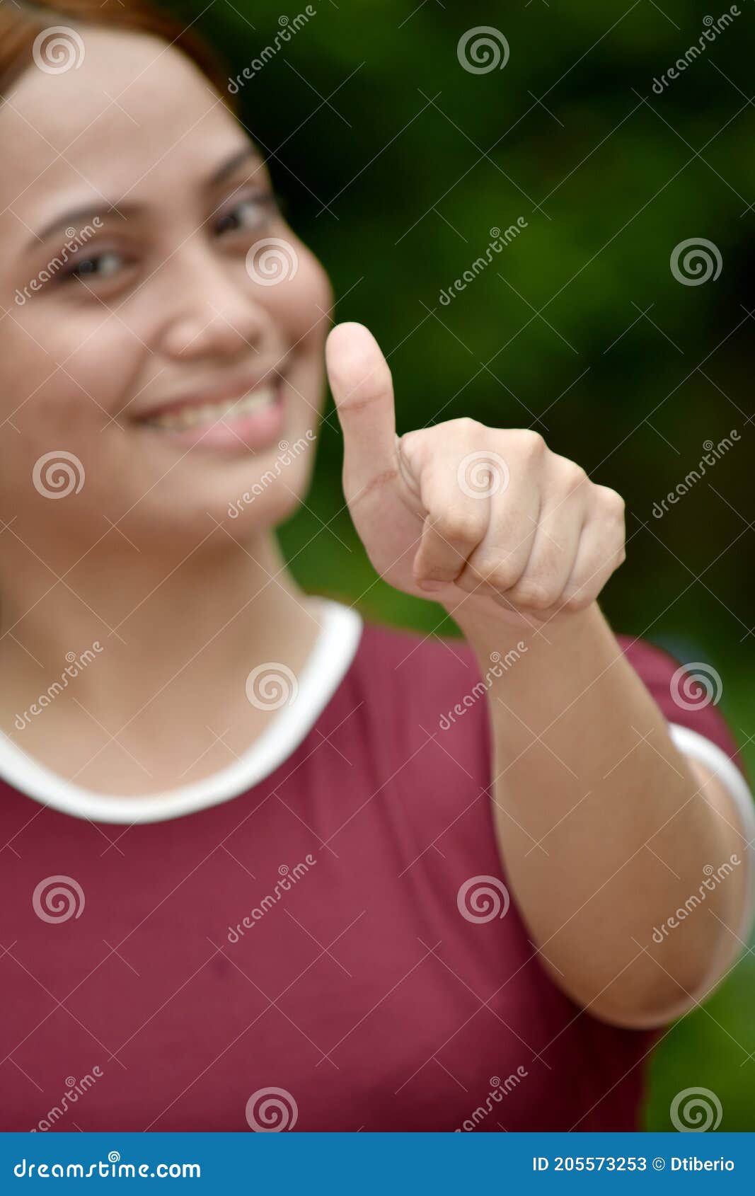 A Female with Thumbs Up stock image. Image of thumbs - 205573253