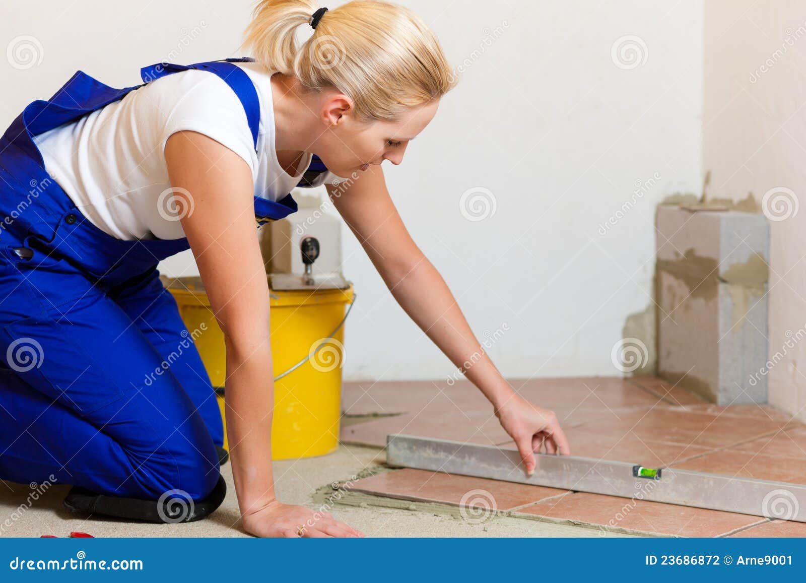 Female Tiler Tiling Tiles on the Floor Stock Photo - Image of tool ...