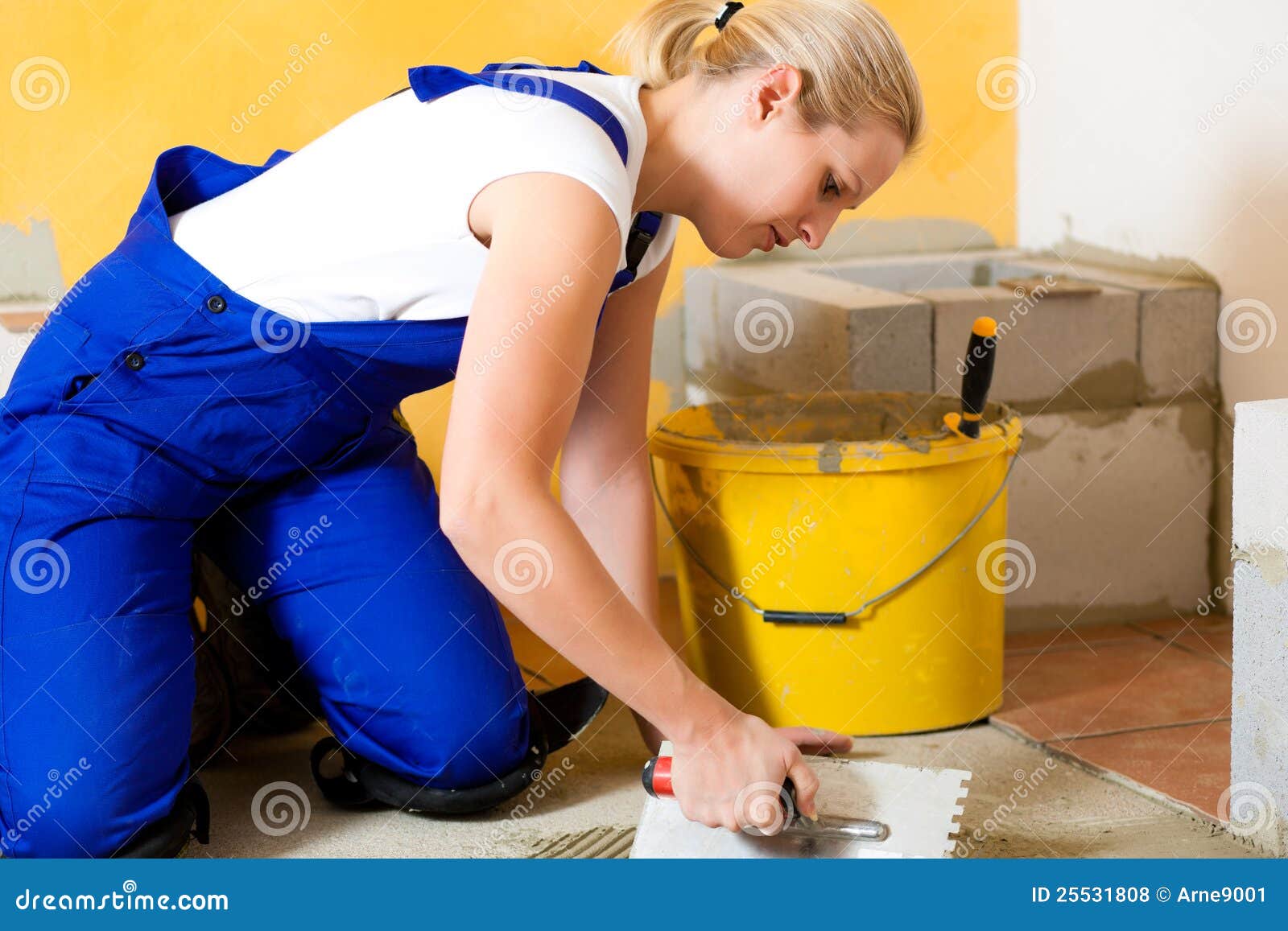 Female Tiler Tiling Tiles on the Floor Stock Photo - Image of trowel ...