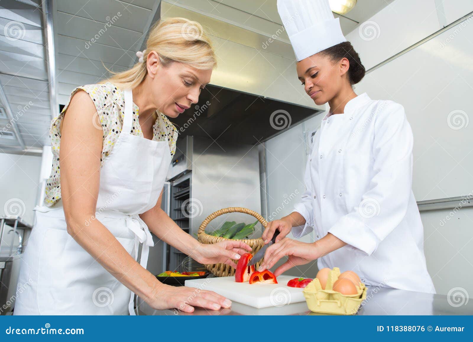 Female Trainee Chef Chopping Peppers Stock Photo - Image of female ...