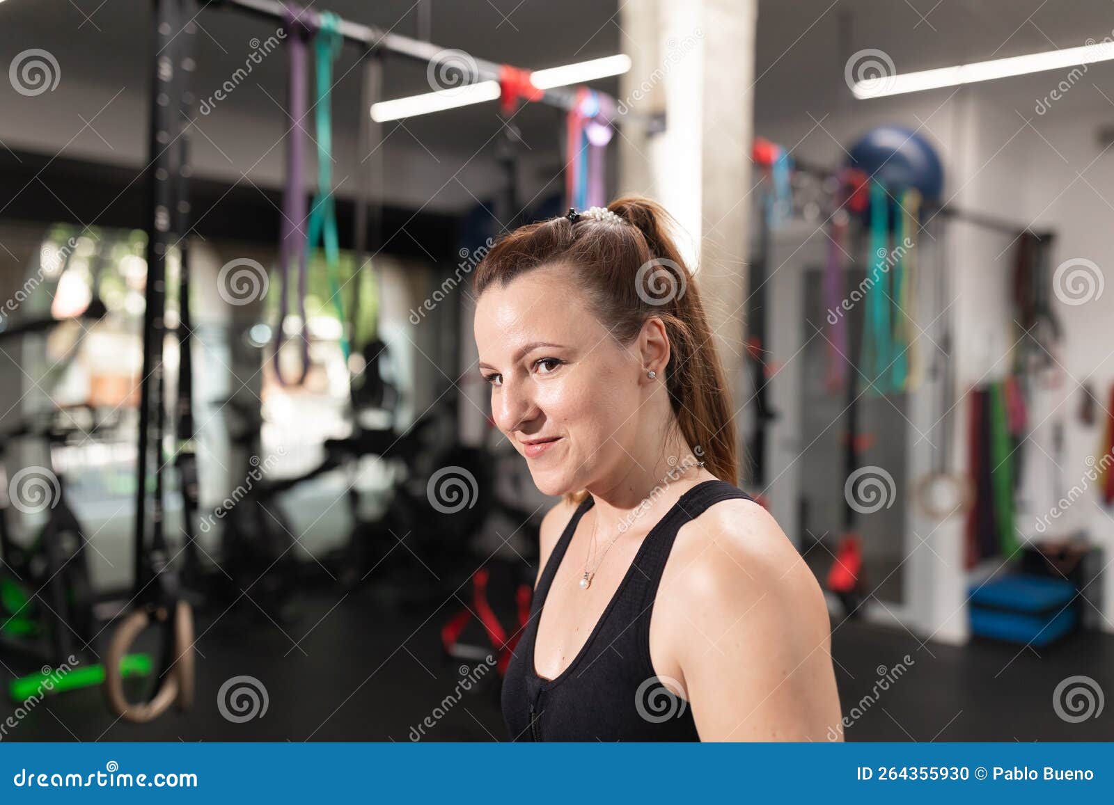 A Female Trainee Looks at Camera with Confidence Stock Photo - Image of ...