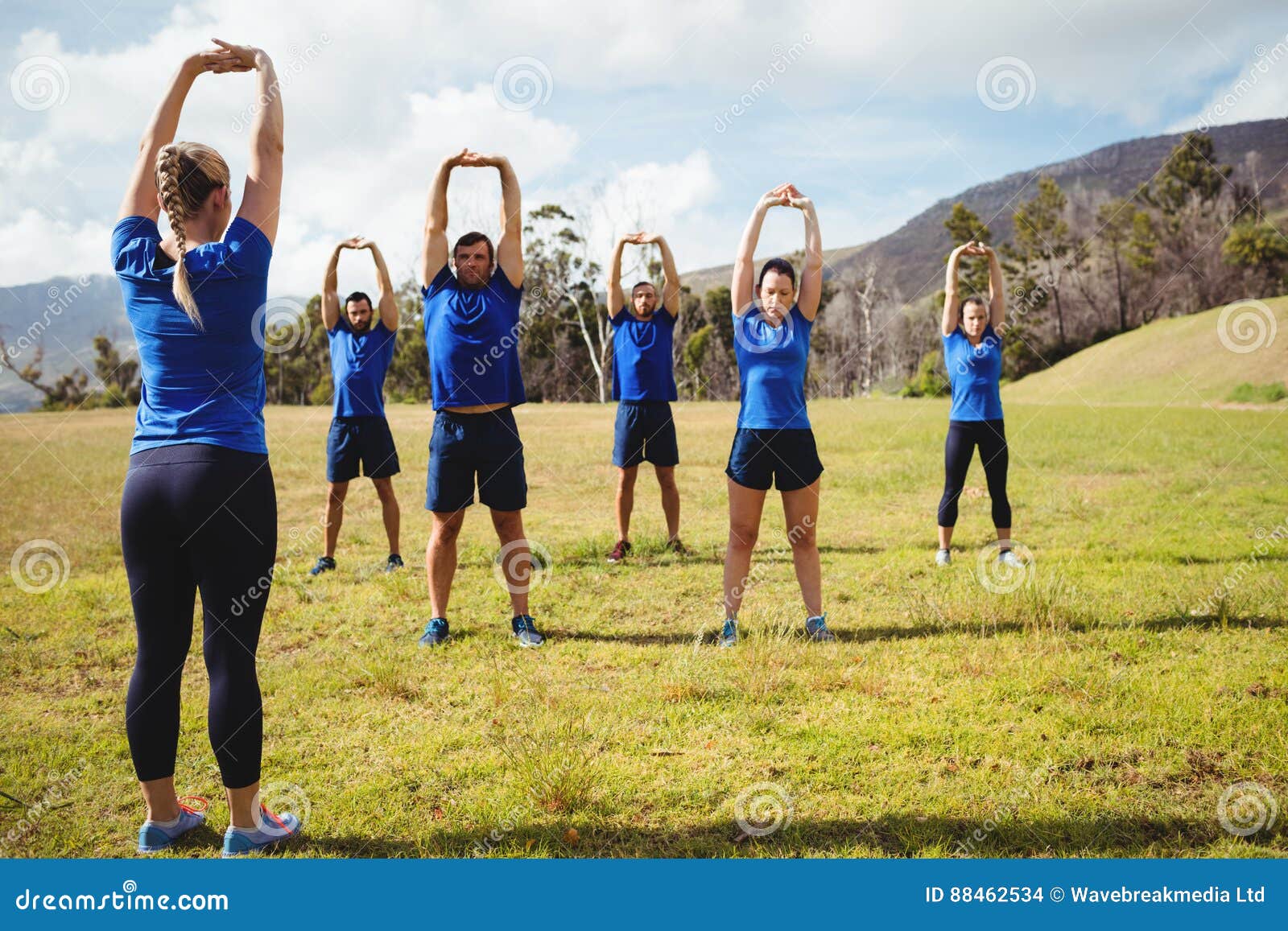 Female Trainer Giving Training To Fit People Stock Photo - Image of ...