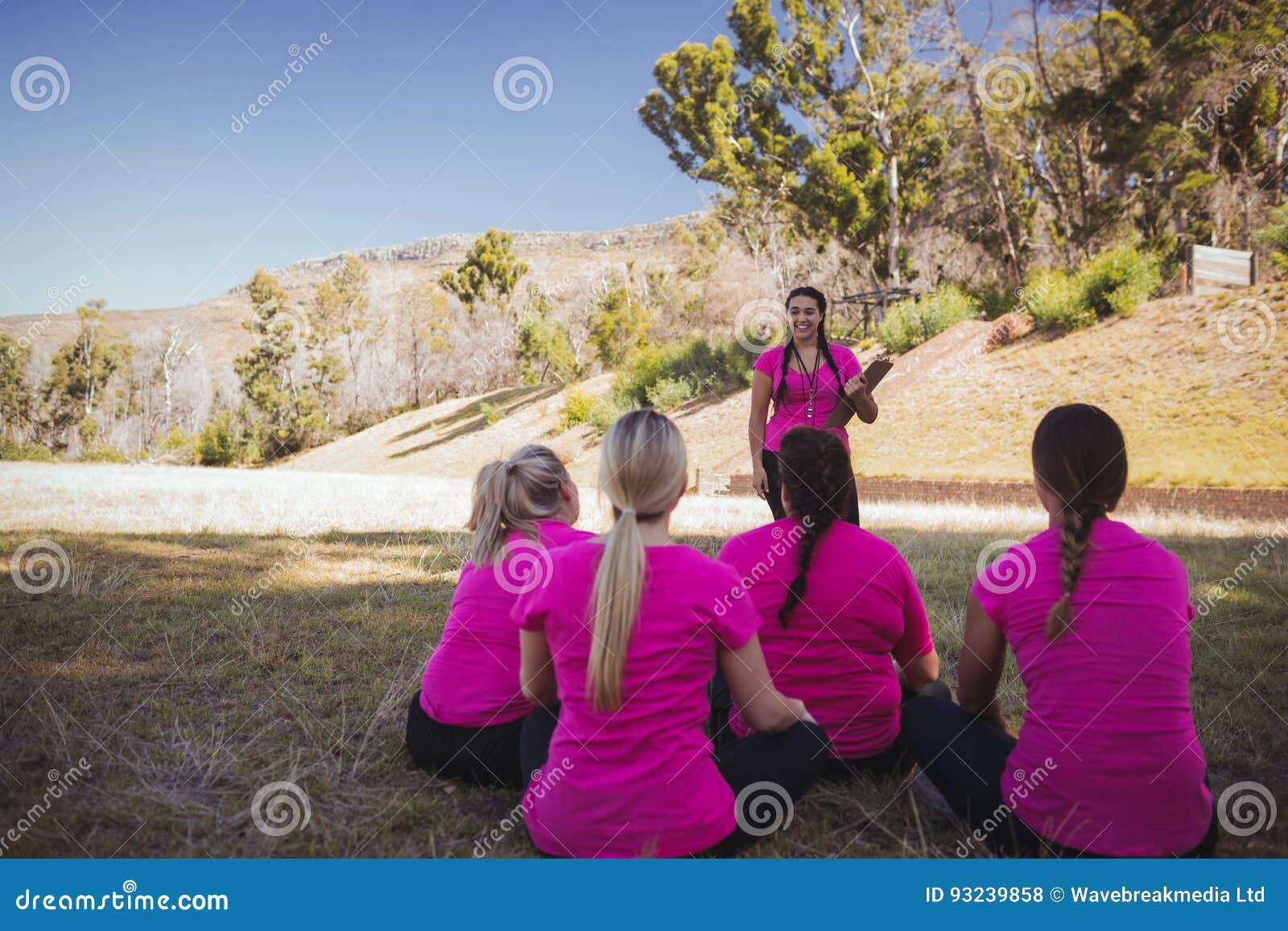 Female Trainer Instructing Women in the Boot Camp Stock Photo - Image ...