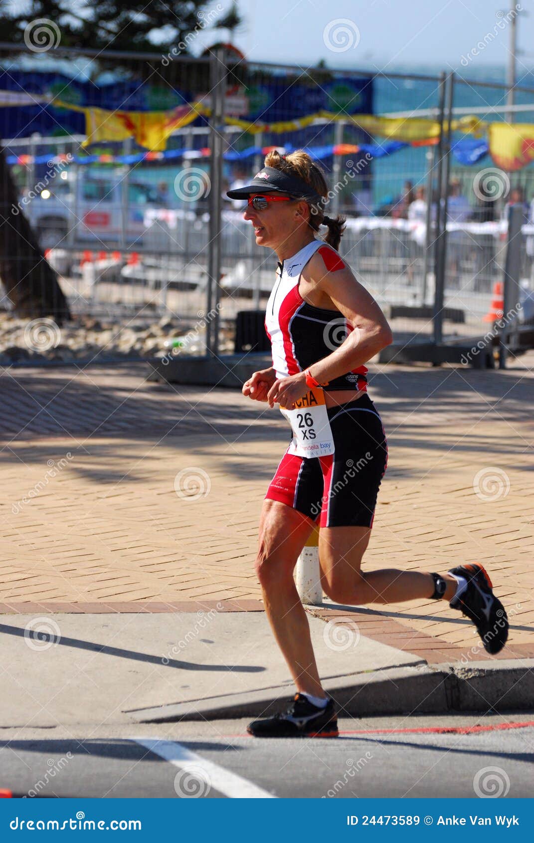 Female triathlete running editorial stock image. Image of competition ...
