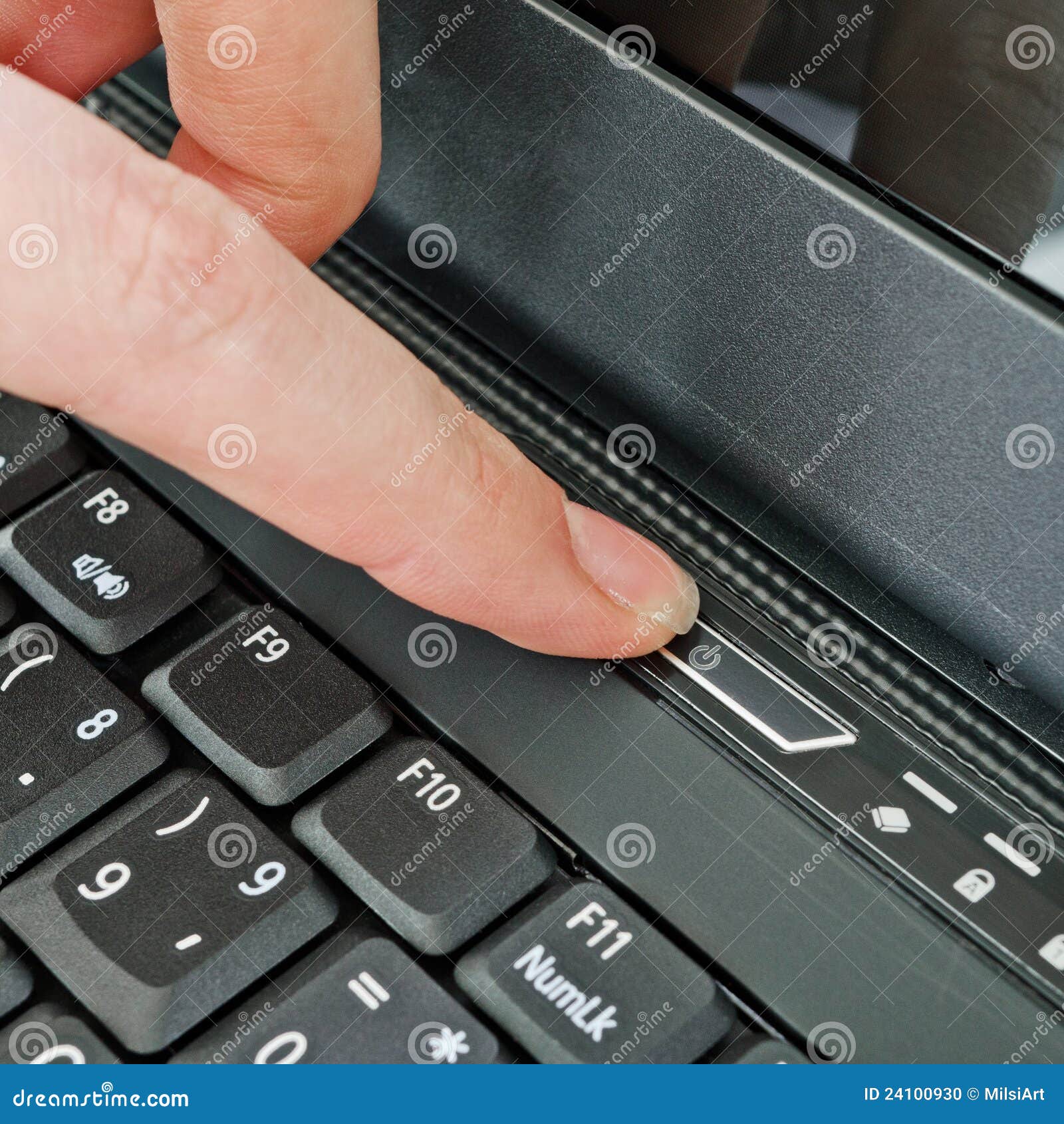 Female turning on a laptop stock photo. Image of finger - 24100930