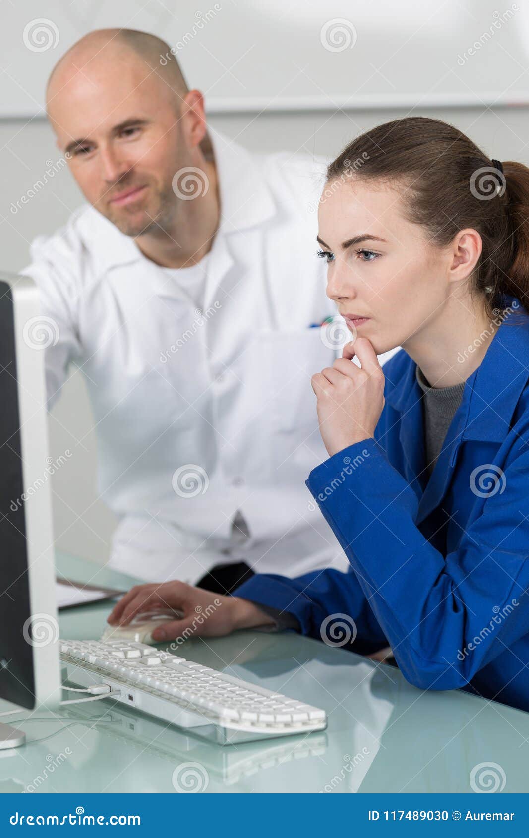 Female Tutor Using Computer in it Class Stock Photo - Image of portrait ...