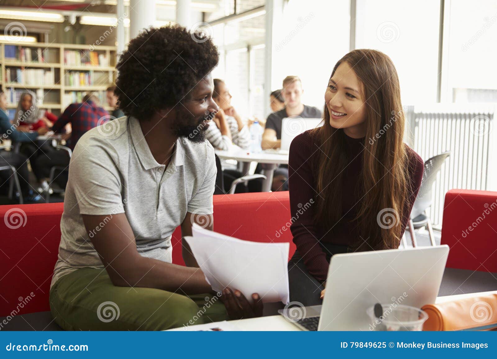 Female University Student Working in Library with Tutor Stock Image ...