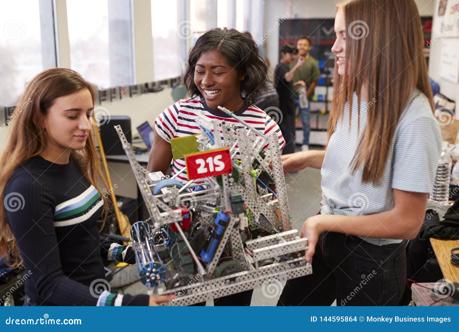 Female University Students Carrying Machine in Science Robotics or ...