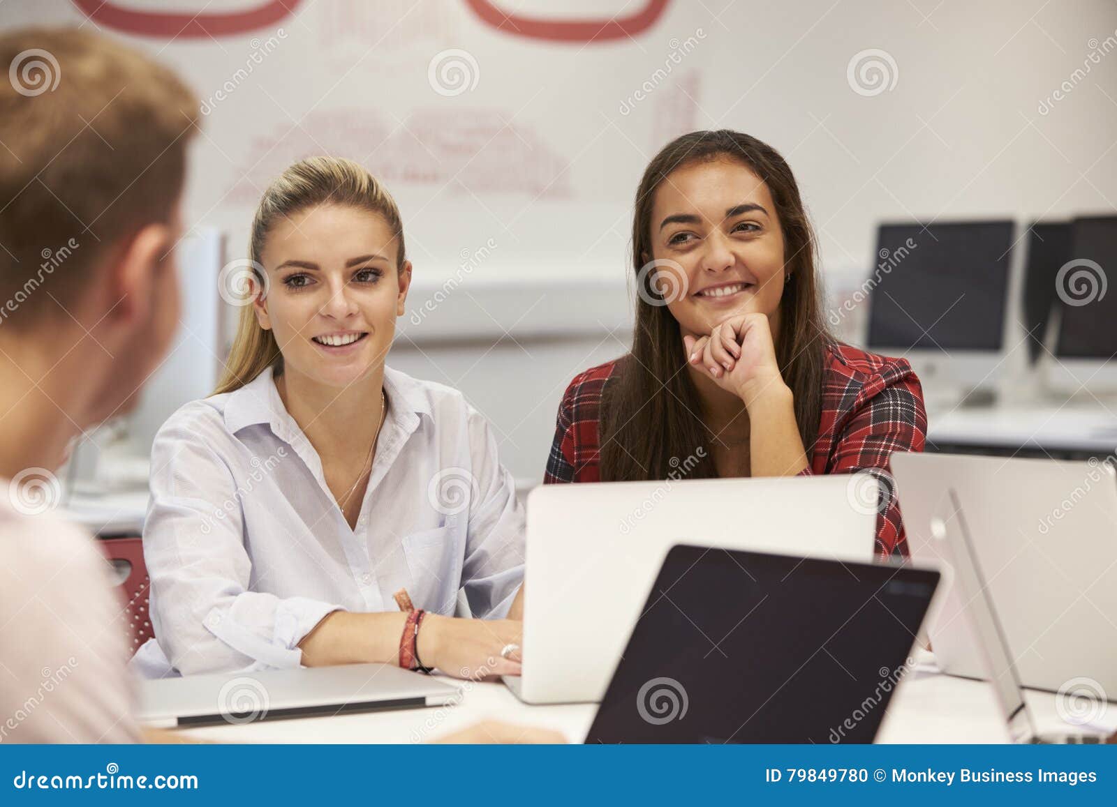Female University Students Collaborating on Project Stock Photo - Image ...
