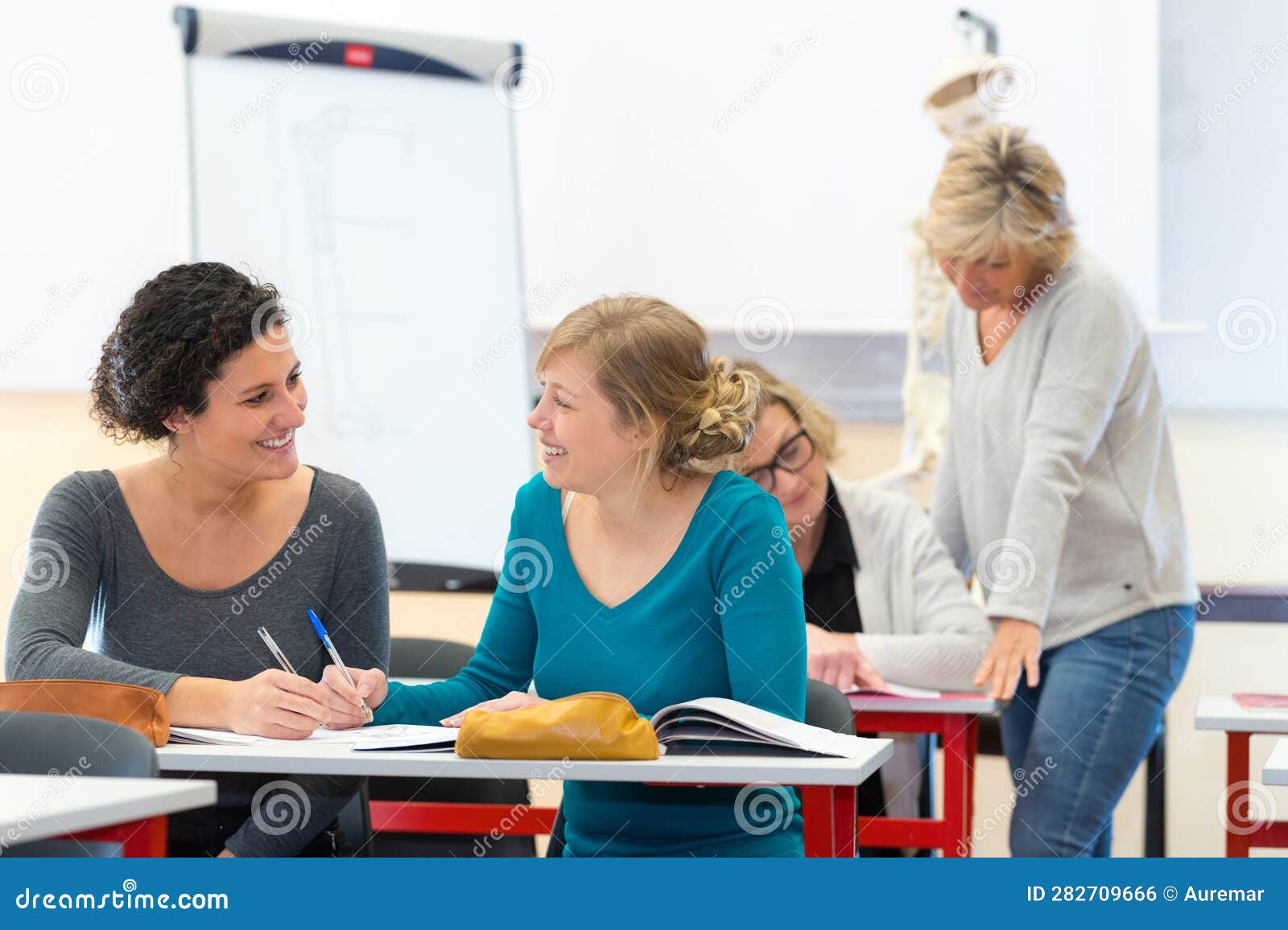 Female University Teacher with Class Stock Photo - Image of ...