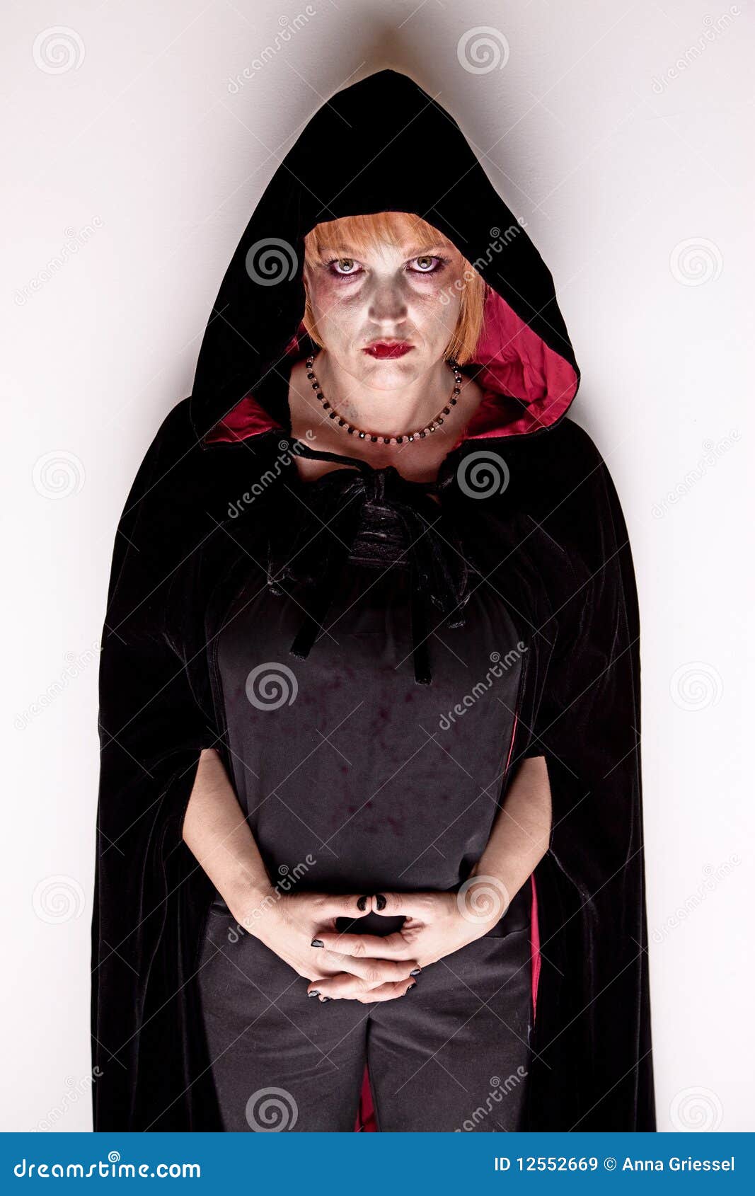 Female Vampire in a Dark Hood Stock Image - Image of adult, pale: 12552669