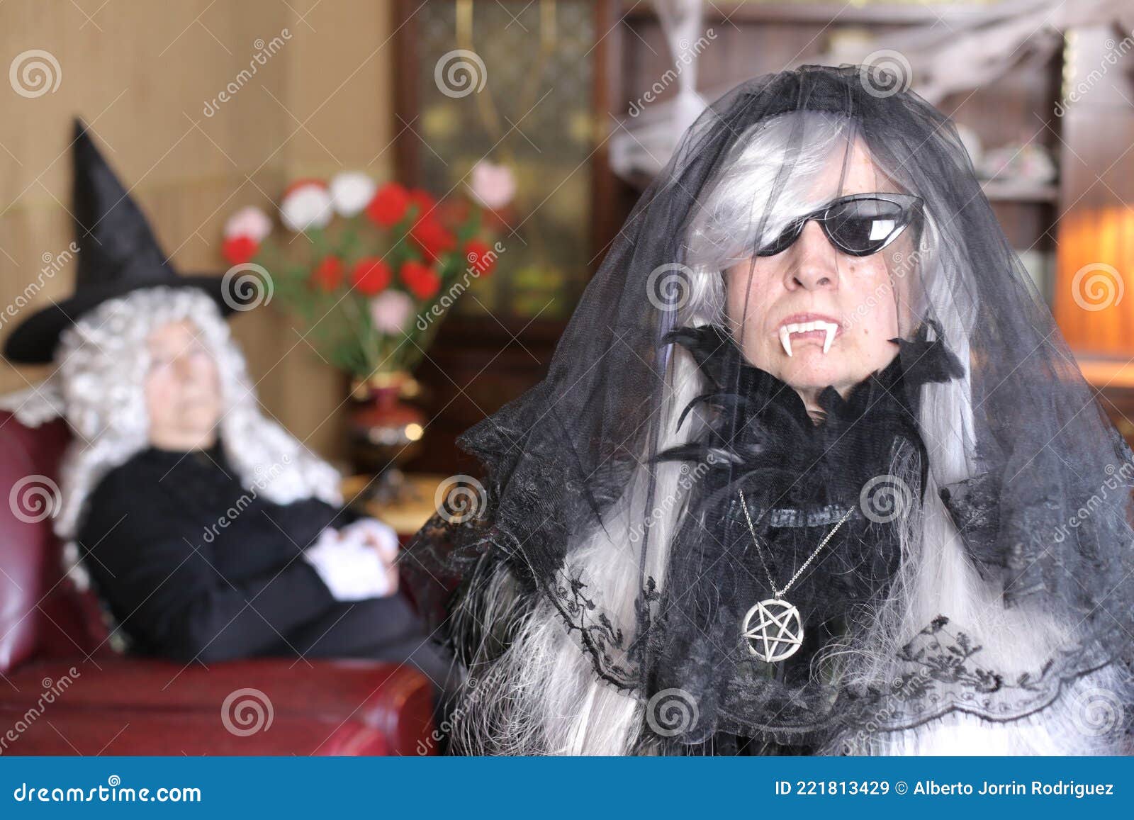 Female Vampire and Witch in the Background Stock Image - Image of evil ...