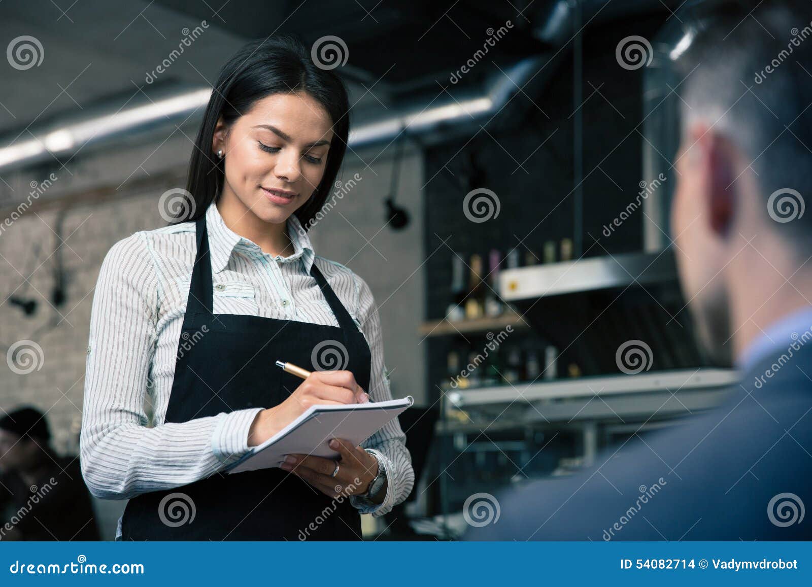 Female Waiter in Apron Writing Order Stock Photo - Image of menu ...