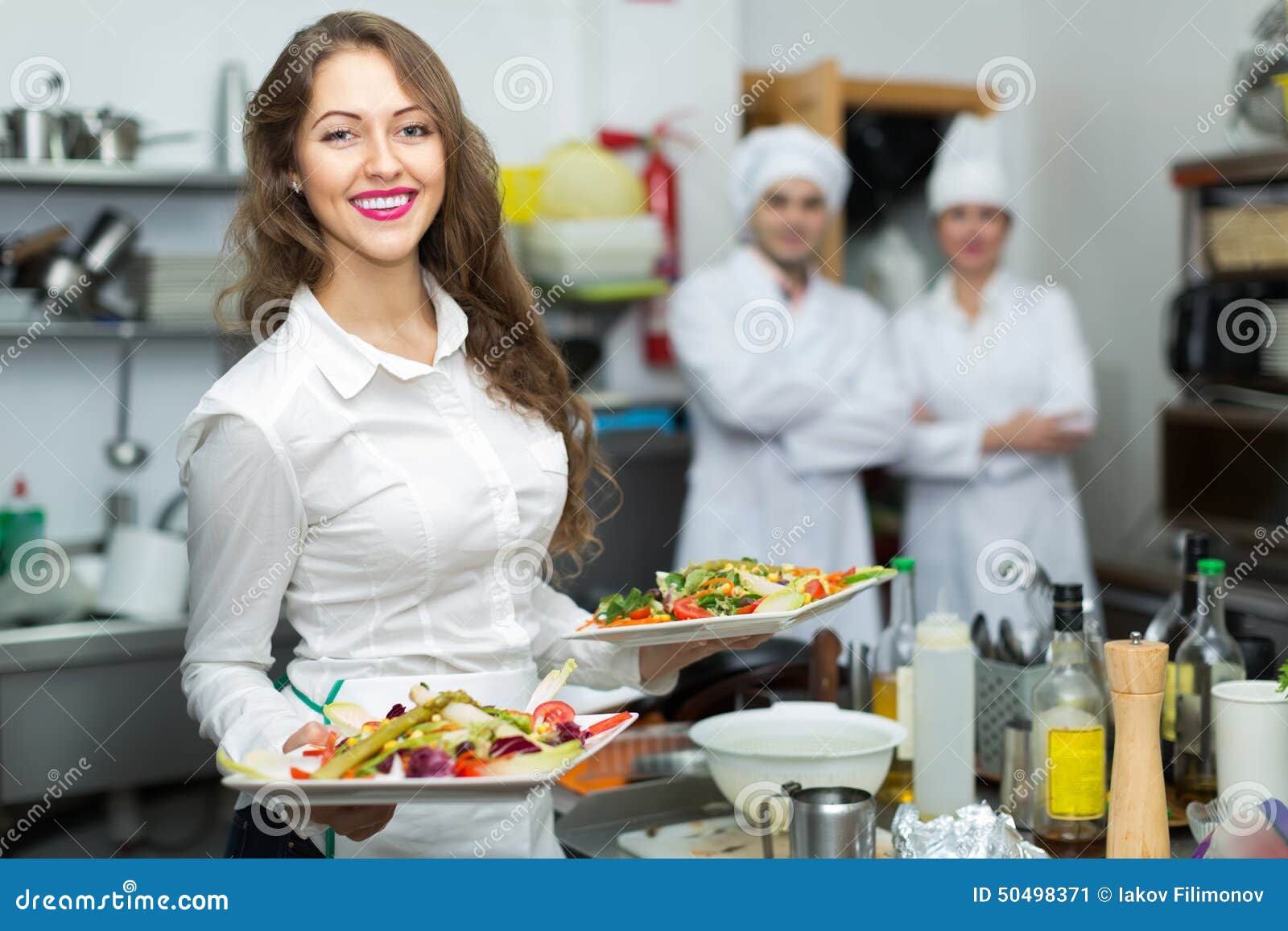 Female Waiter Taking Dish at Kitchen Stock Image - Image of happy ...