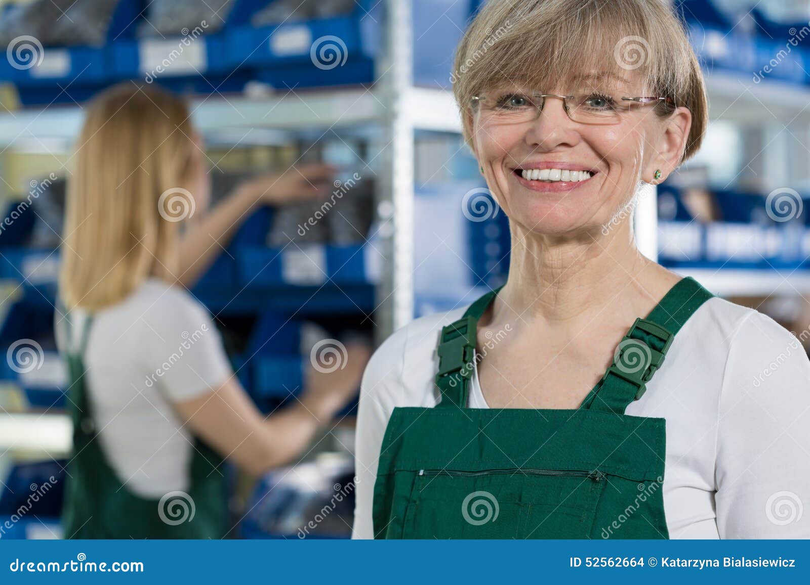 Female warehouse worker stock photo. Image of blonde - 52562664