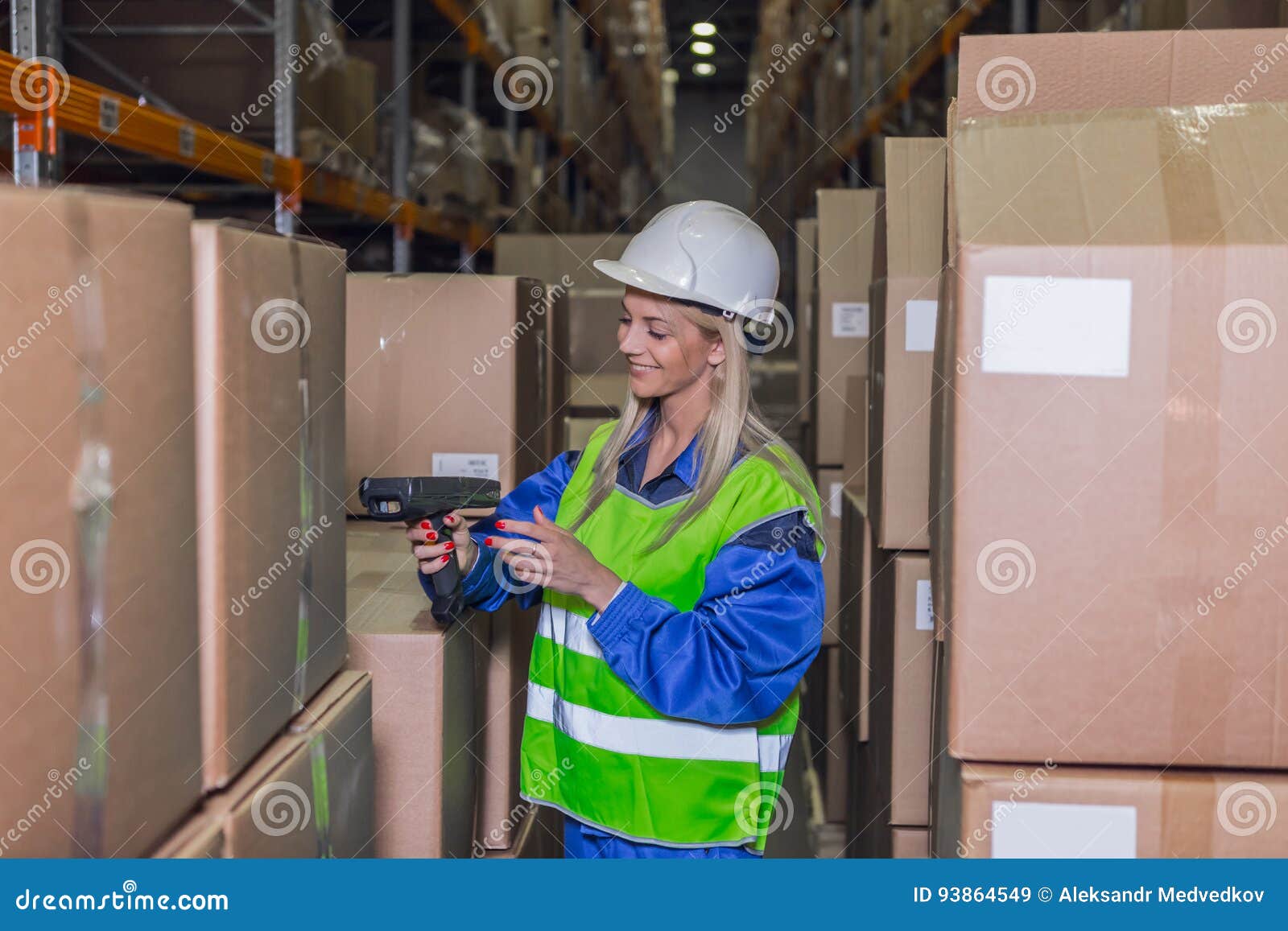 Female Warehouse Worker Using Scanner in Storehouse Stock Image - Image ...