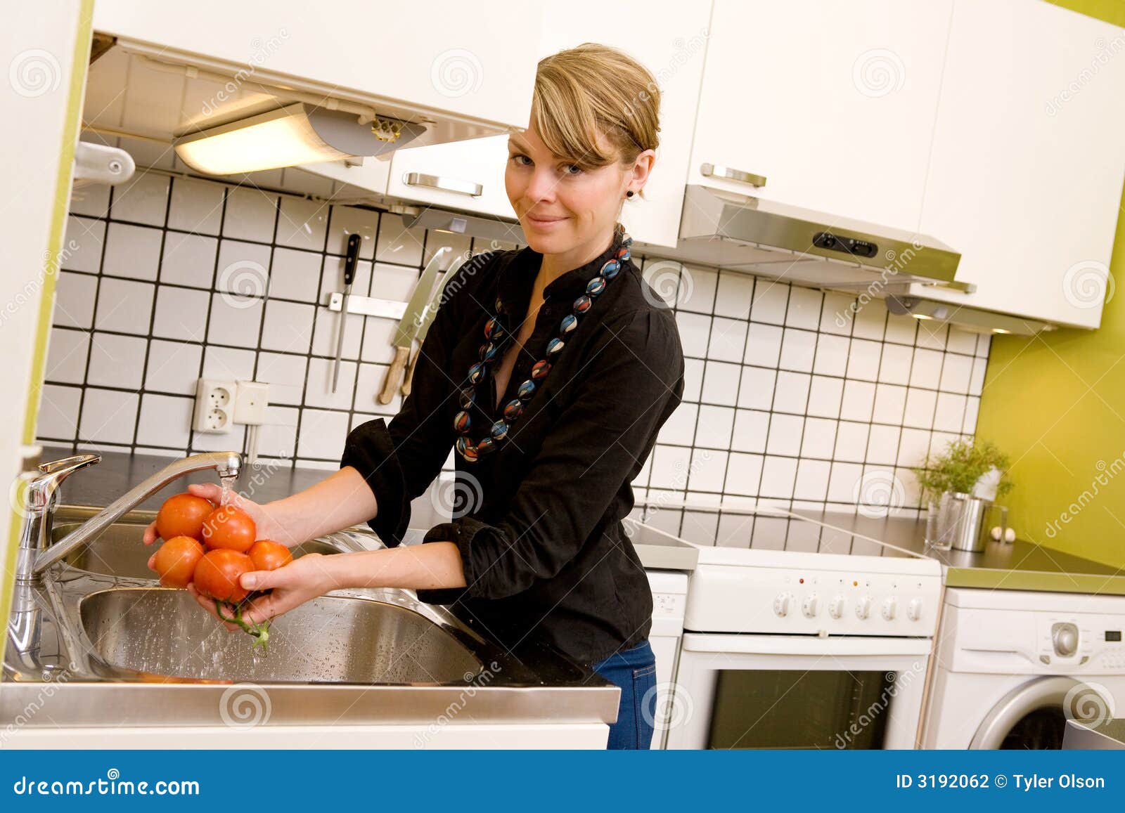 Female Washing Tomatoes stock photo. Image of rinse, tomato - 3192062