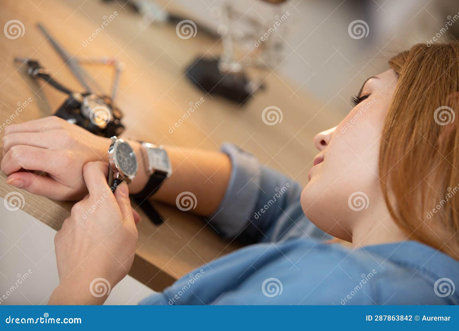 Female Watch Repairer Comparing Faces on Two Watches Stock Photo ...