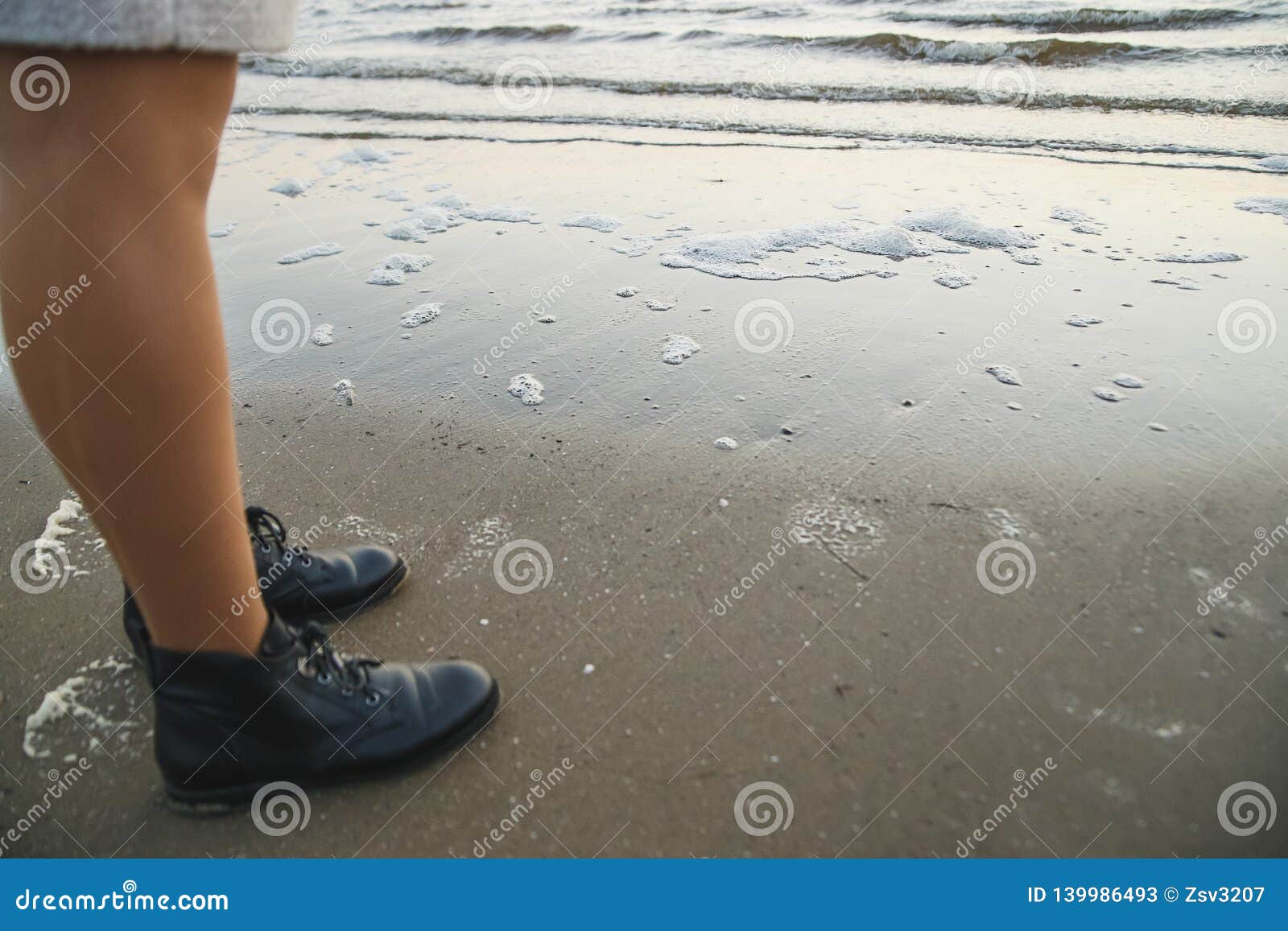 Female in Waterproof Leather Boots on Sea Sand Stock Image - Image of ...