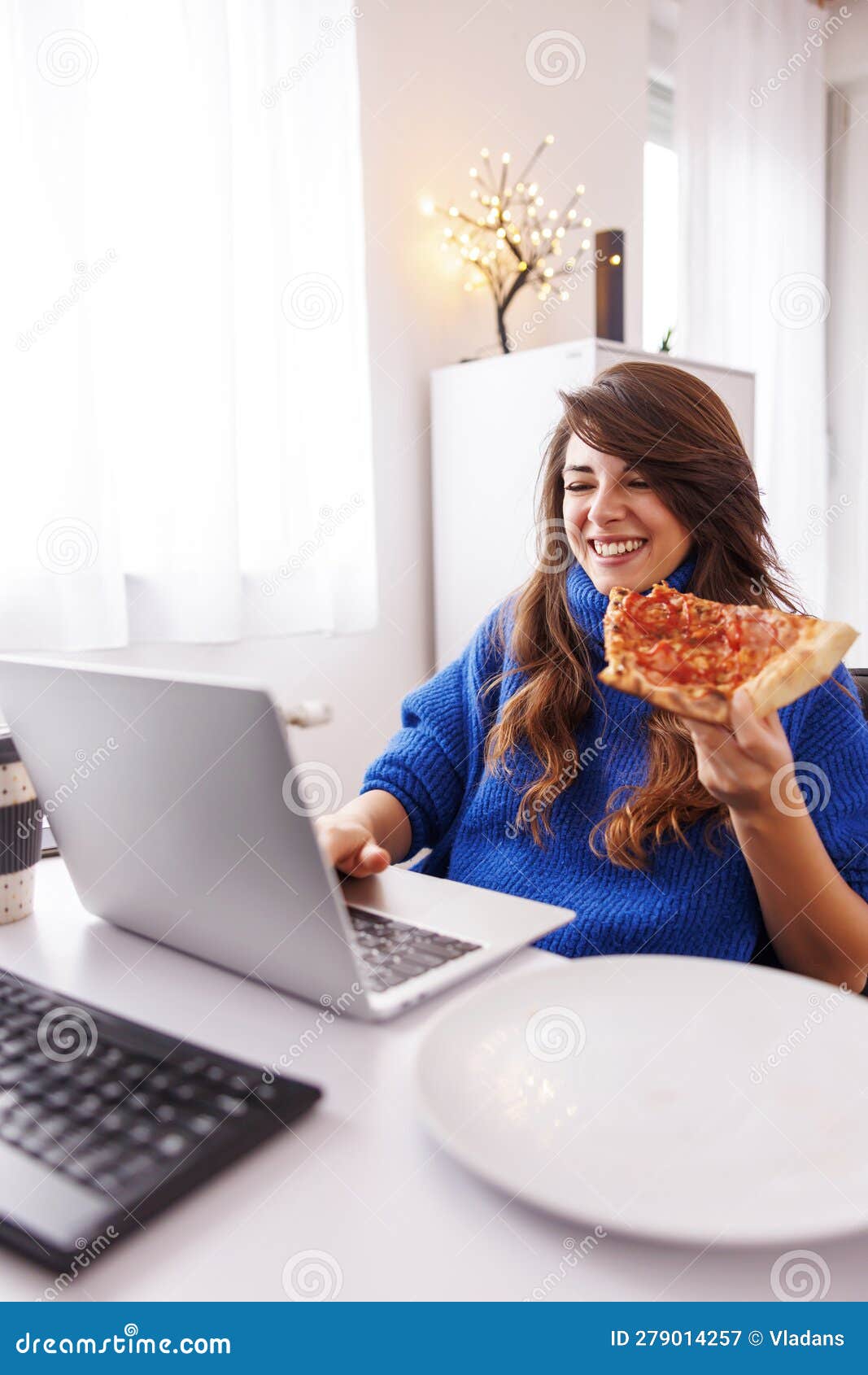 Female Web Developer Taking a Break while Working Remotely from Home ...
