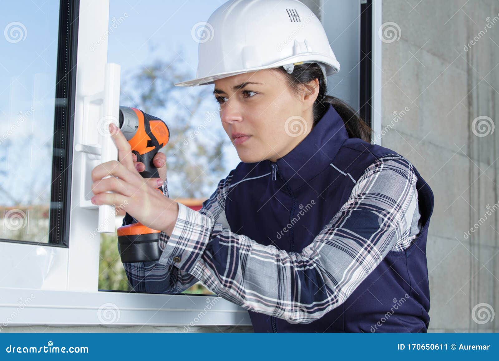 Female Window Fitter Using Cordless Screwdriver Stock Image - Image of ...