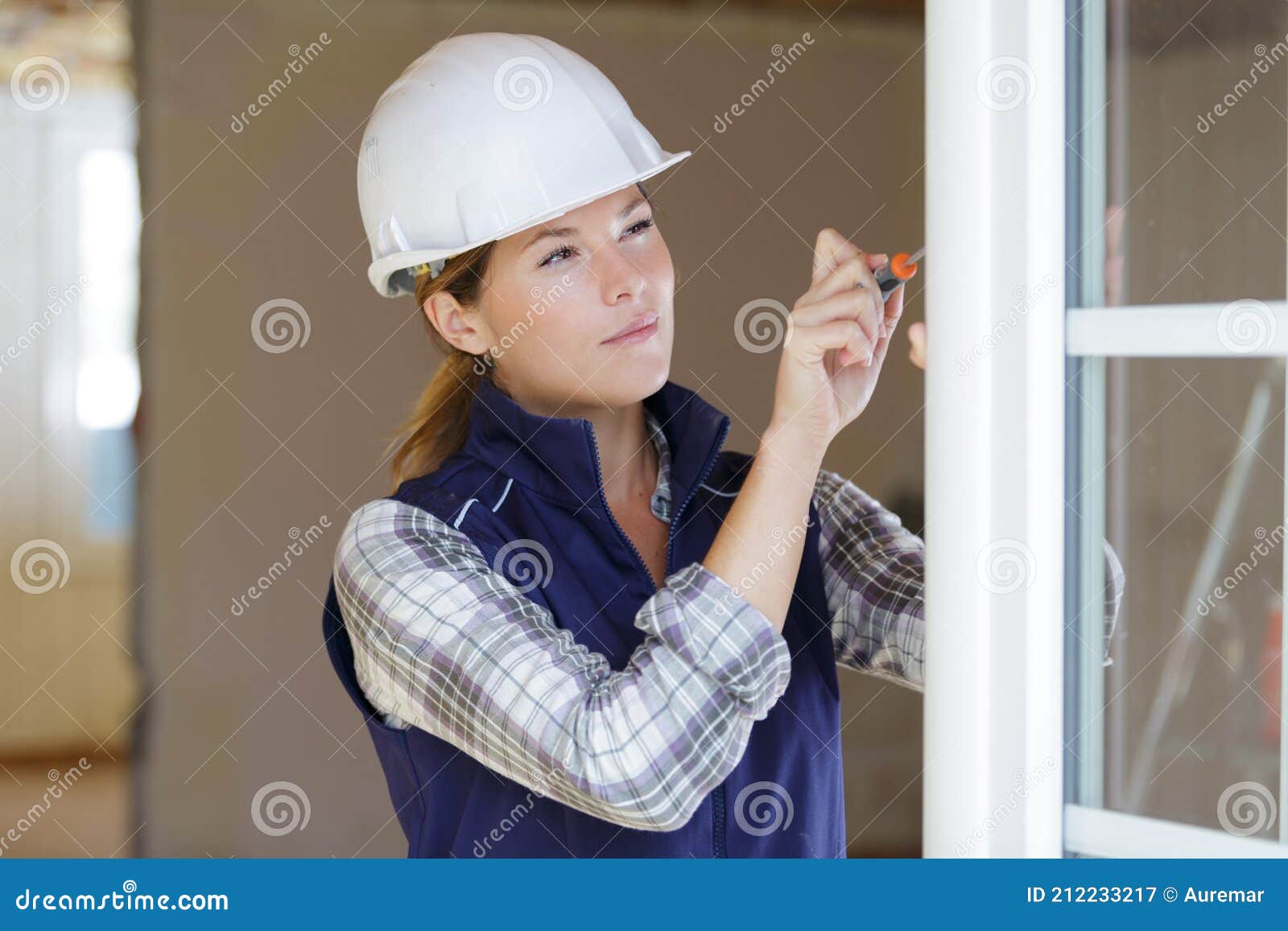 Female Window Fitter Using Screwdriver Stock Image - Image of ...