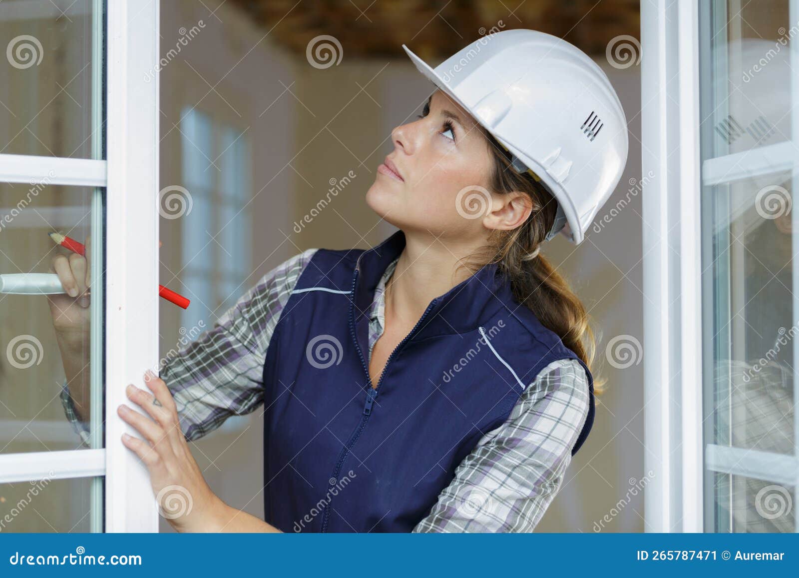 Female Window Fitter at Work Stock Image - Image of lookingup, inspect ...